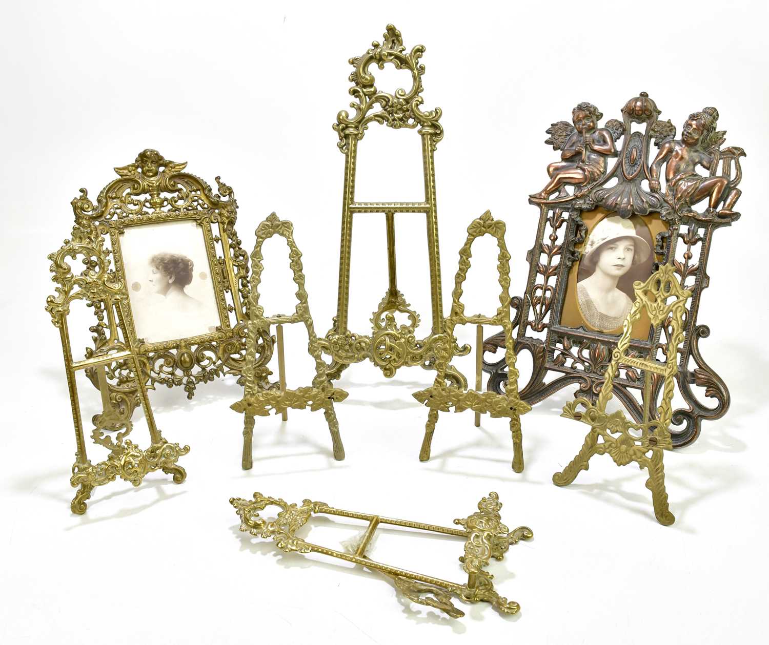 Lot 1159 - A group of six small brass easels, together