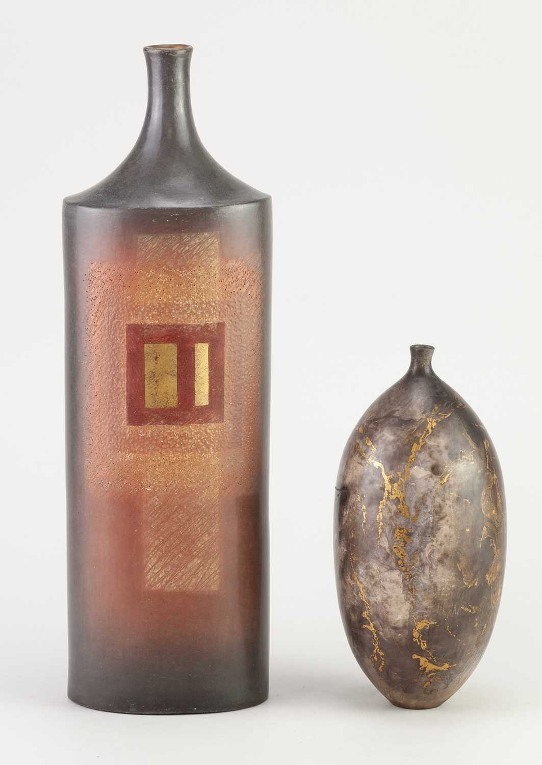 Lot 99 - ANNE JAMES (born 1937); a tall raku bottle