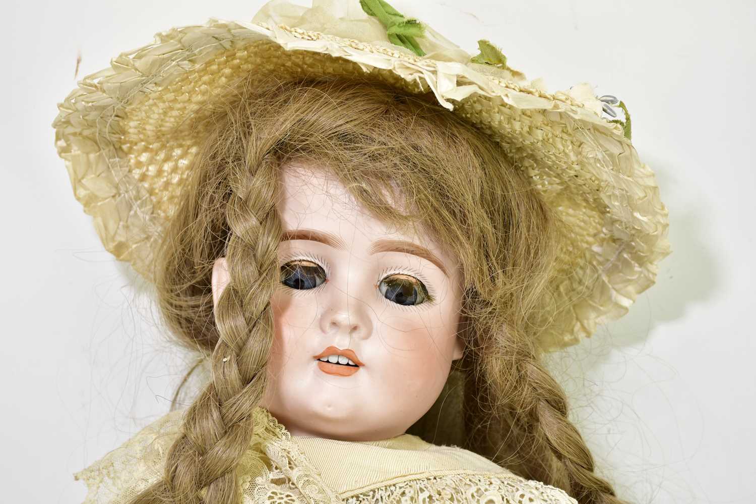 Lot 65 - MAX HANDWERCK; a German bisque headed doll