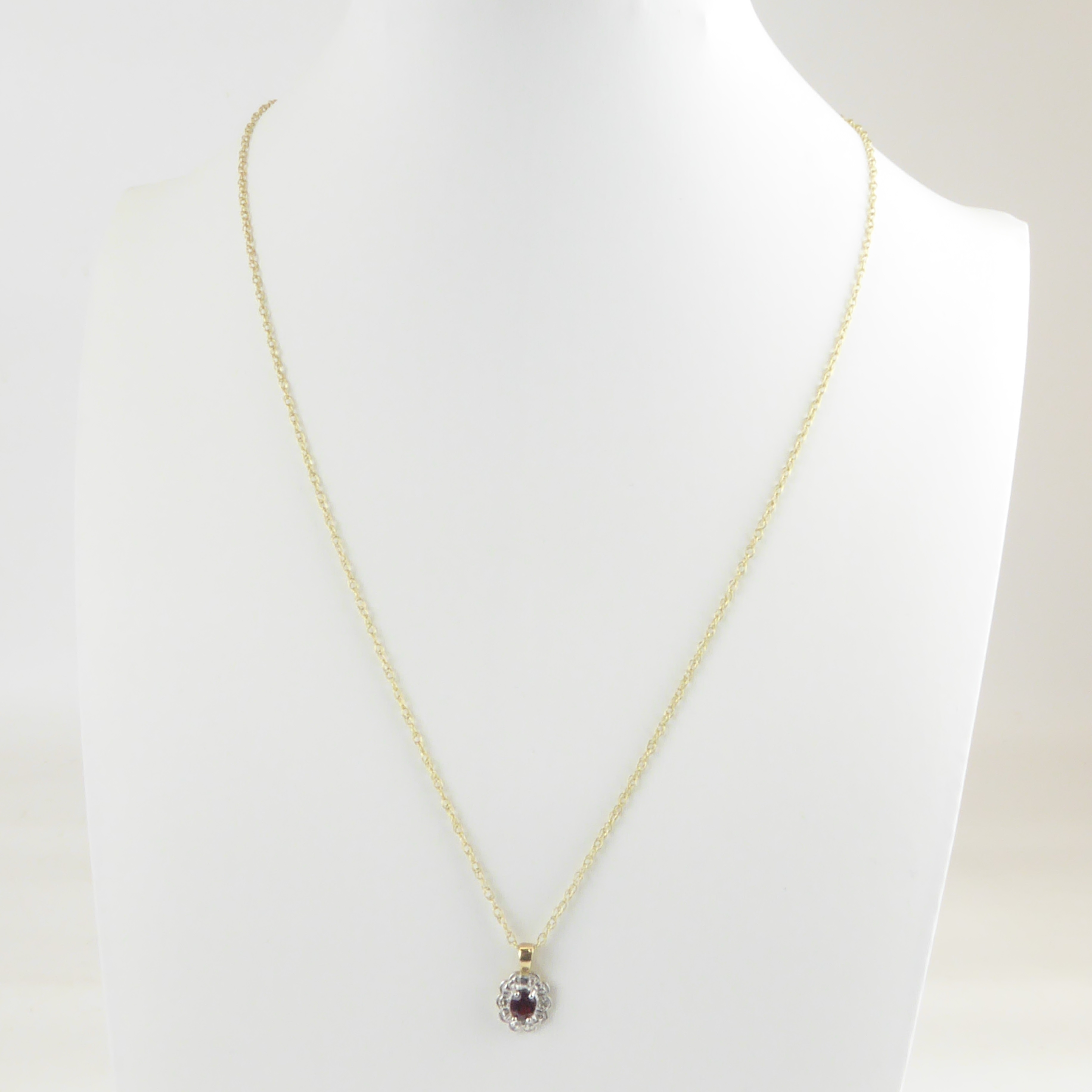 Lot 1117 - A 9ct gold dainty necklace chain with claw