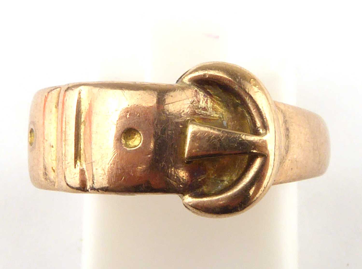 Lot 974 - A late 19th century 9ct rose gold belt ring,