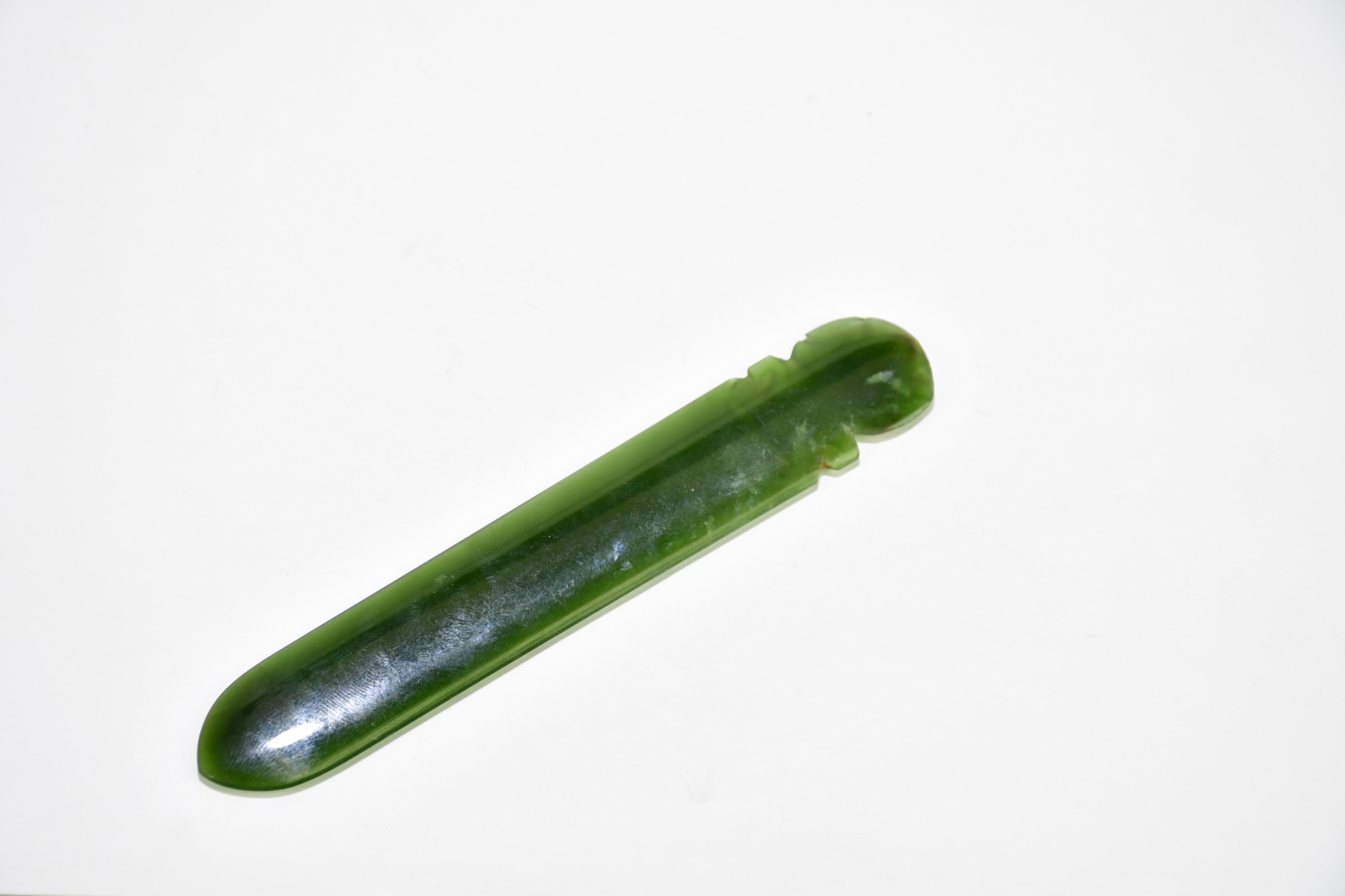 Lot 1120 - A Maori nephrite jade paper knife decorated