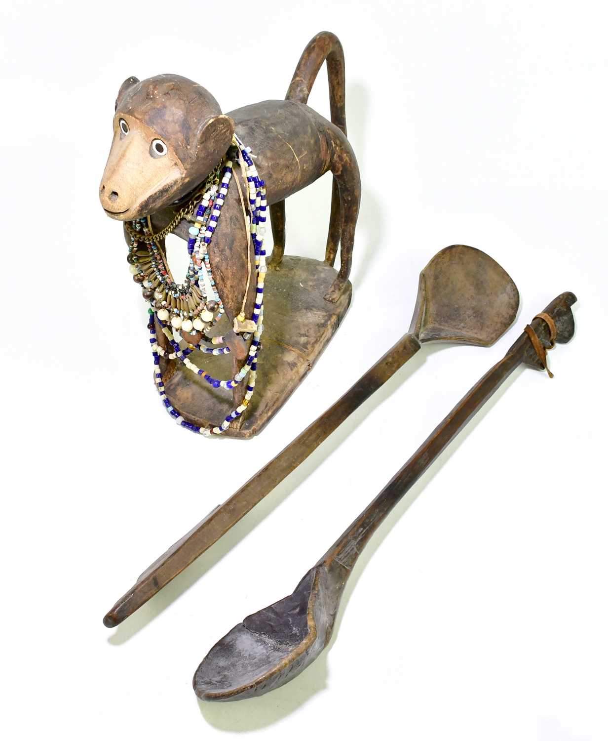 Lot 1122 - Two African tribal oversized spoons/scoops,