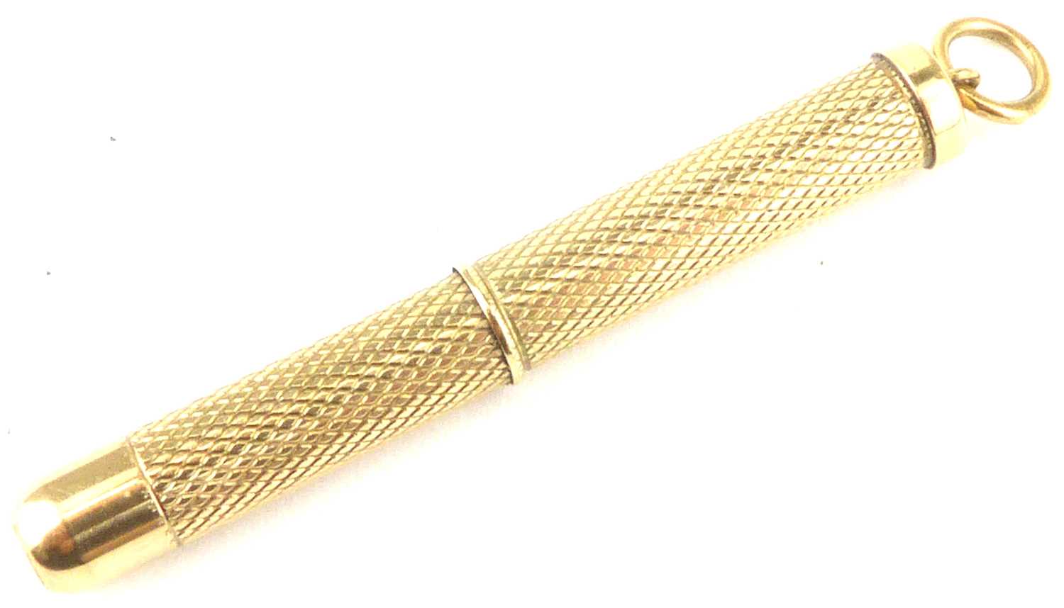 Lot 1203 - A 9ct gold chain mounted toothpick with