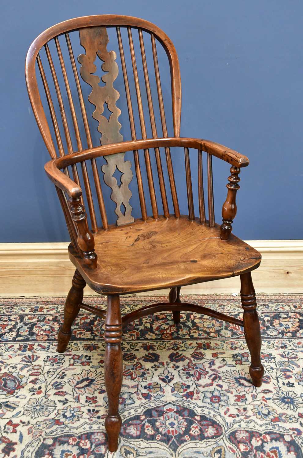 Lot 1527 - An early 19th century yew wood tall back