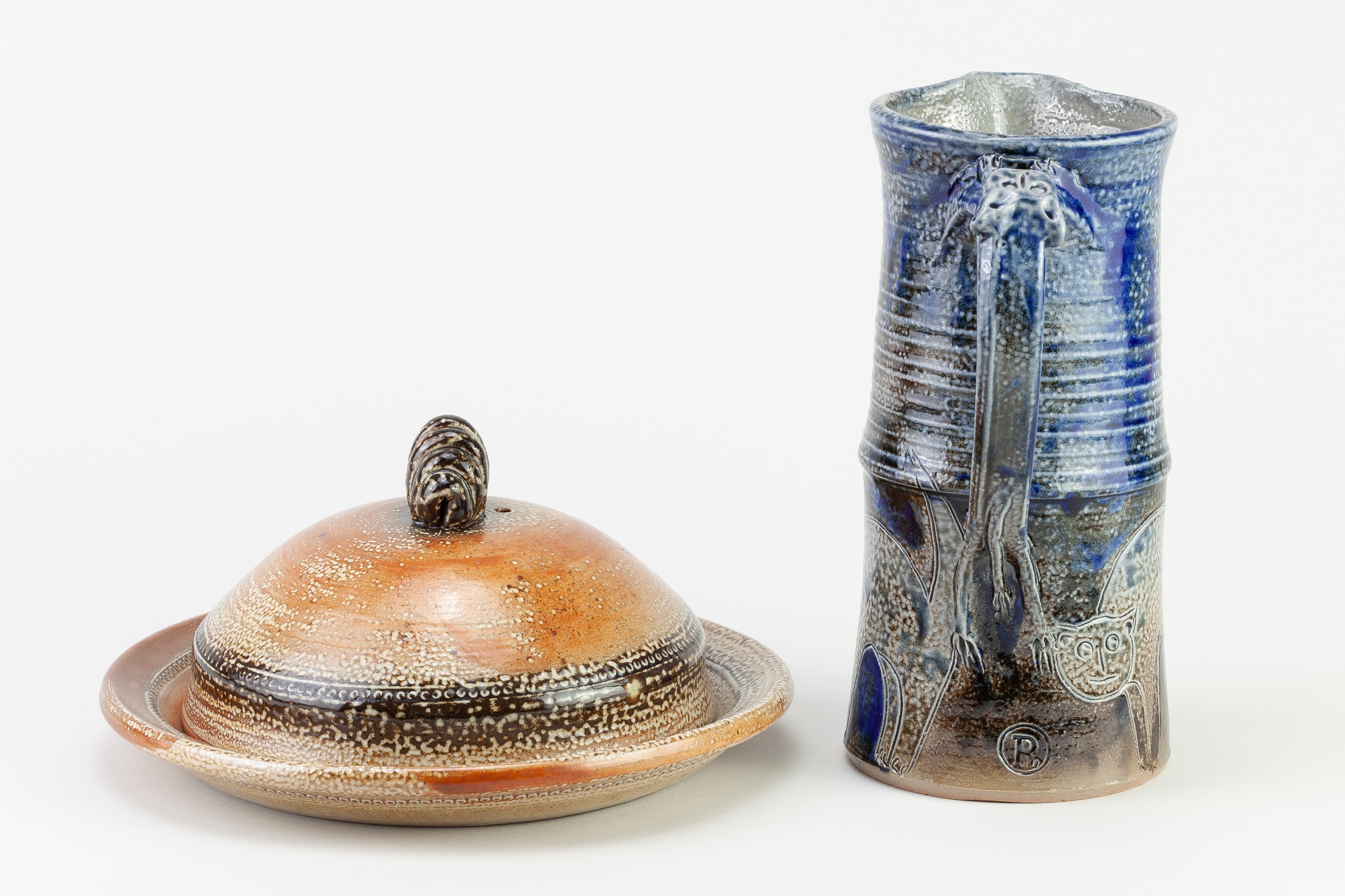 Lot 686 - ROWENA KINSMAN; a salt glazed jug decorated