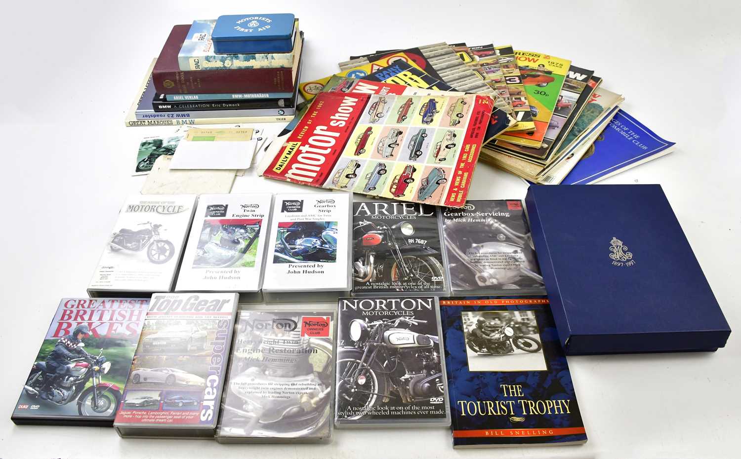 Lot 16 - A collection of automotive books and ephemera