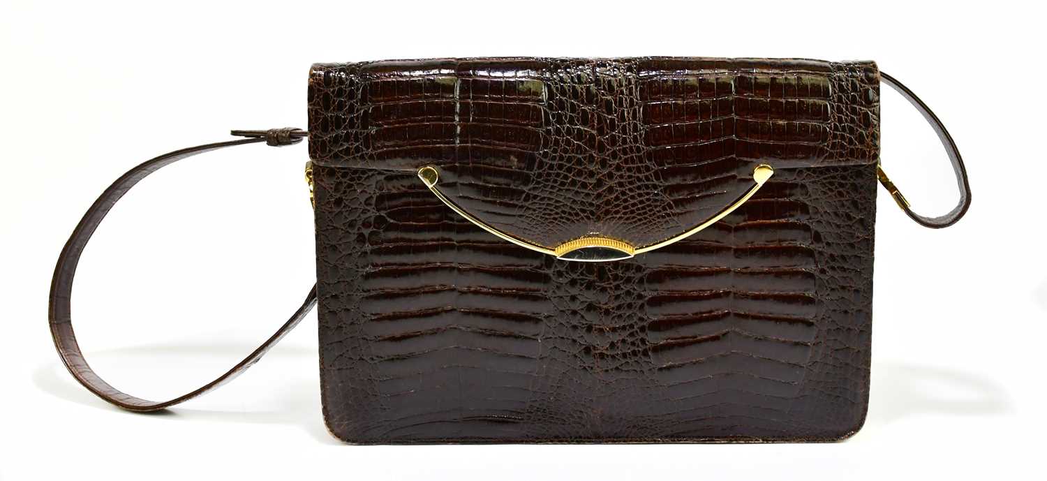 Lot 704 - ALFRED ROTH; a 1950s vintage brown crocodile