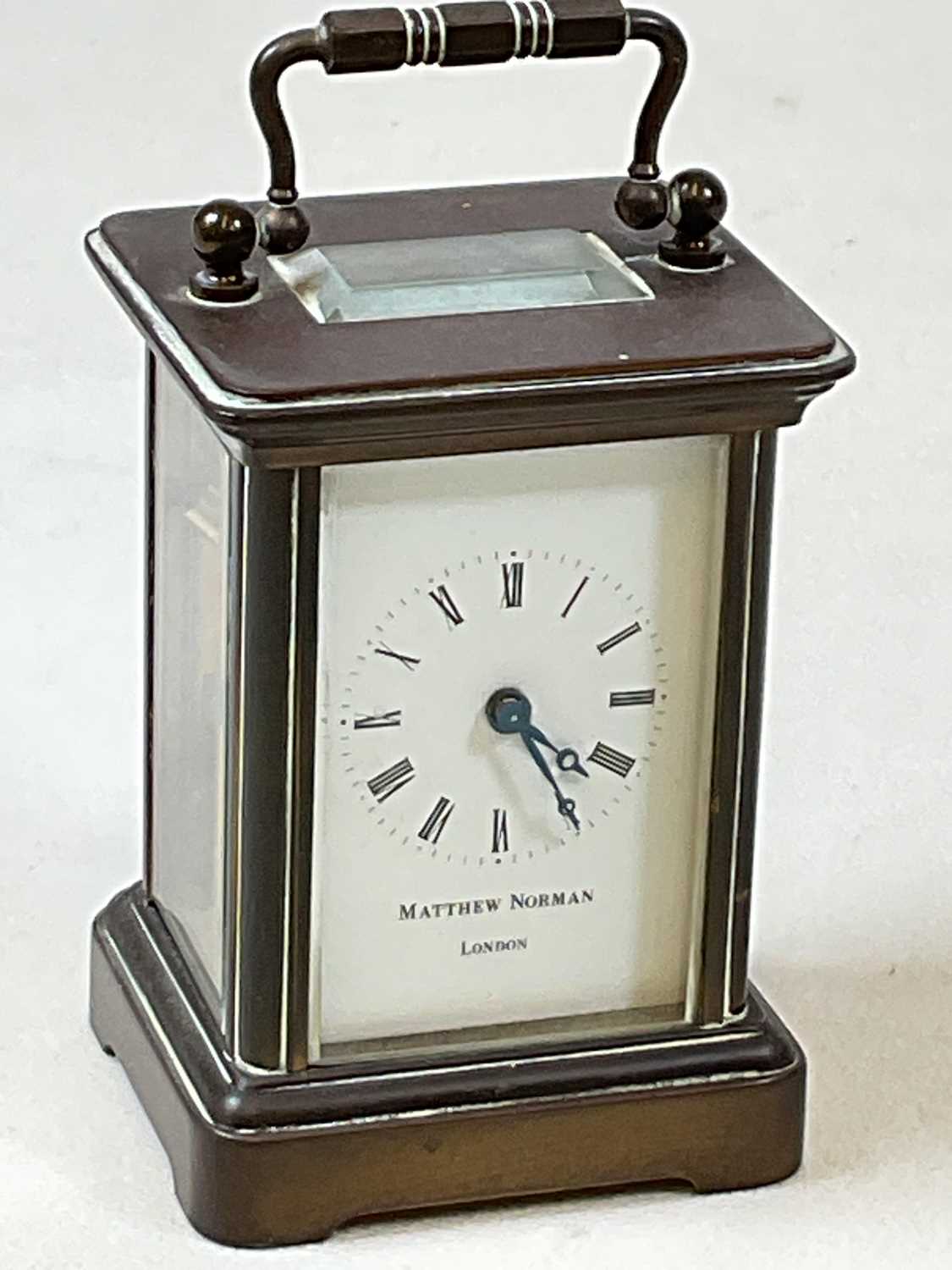 Lot 488 - MATTHEW NORMAN; a brass carriage clock of