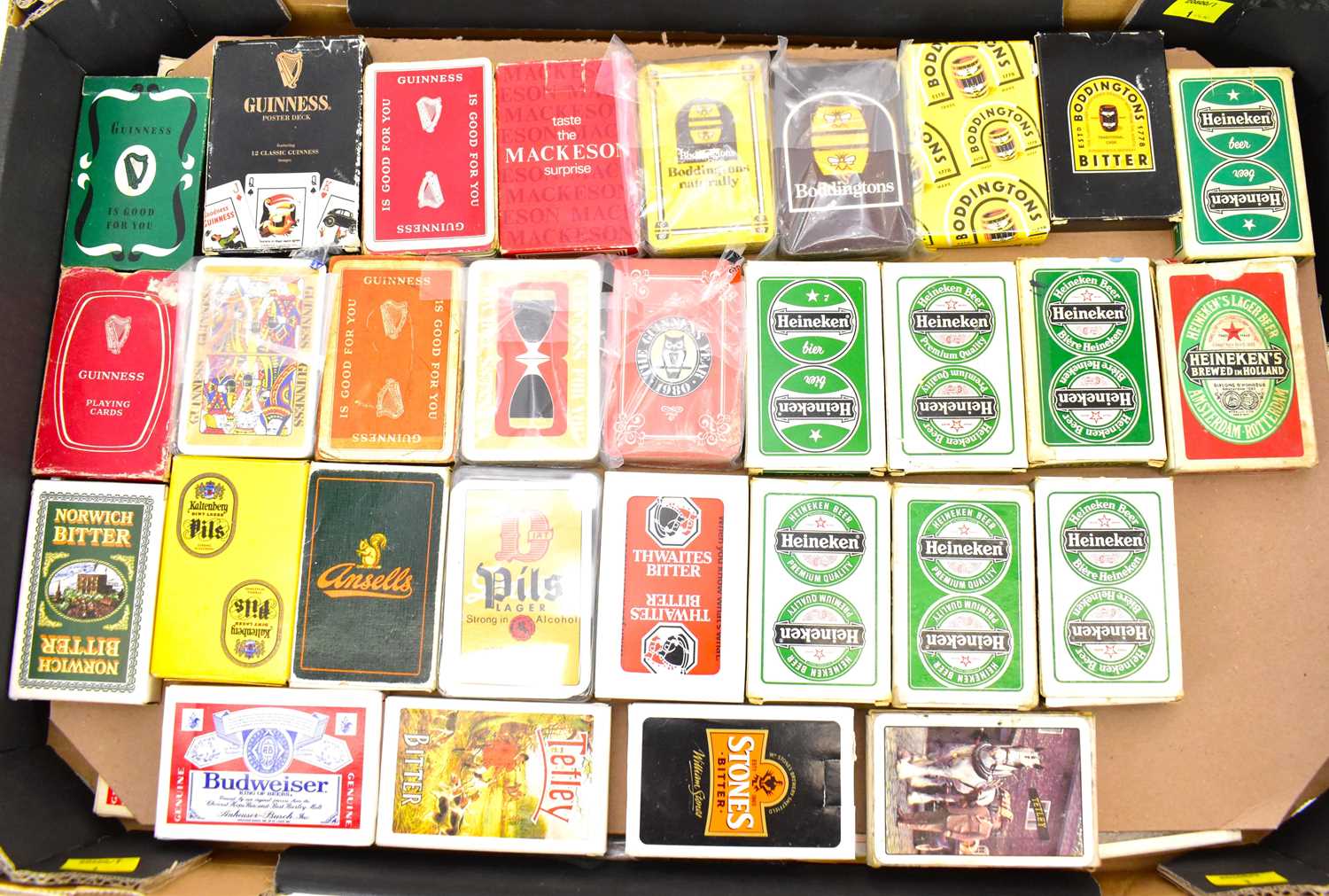 Lot 492 - Sixty packs of playing cards, all with beer
