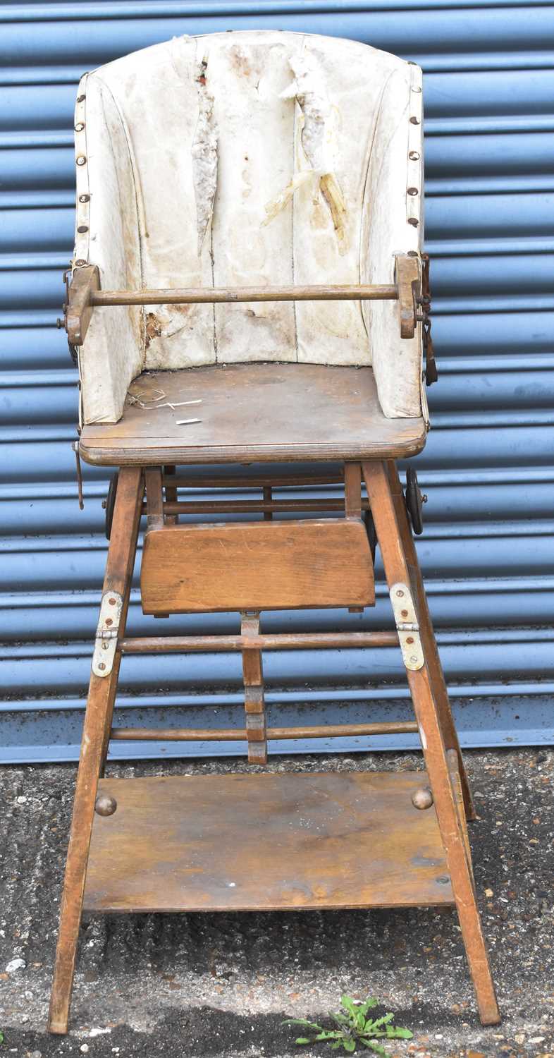 Lot 70 - A child's metamorphic high chair, height 95cm