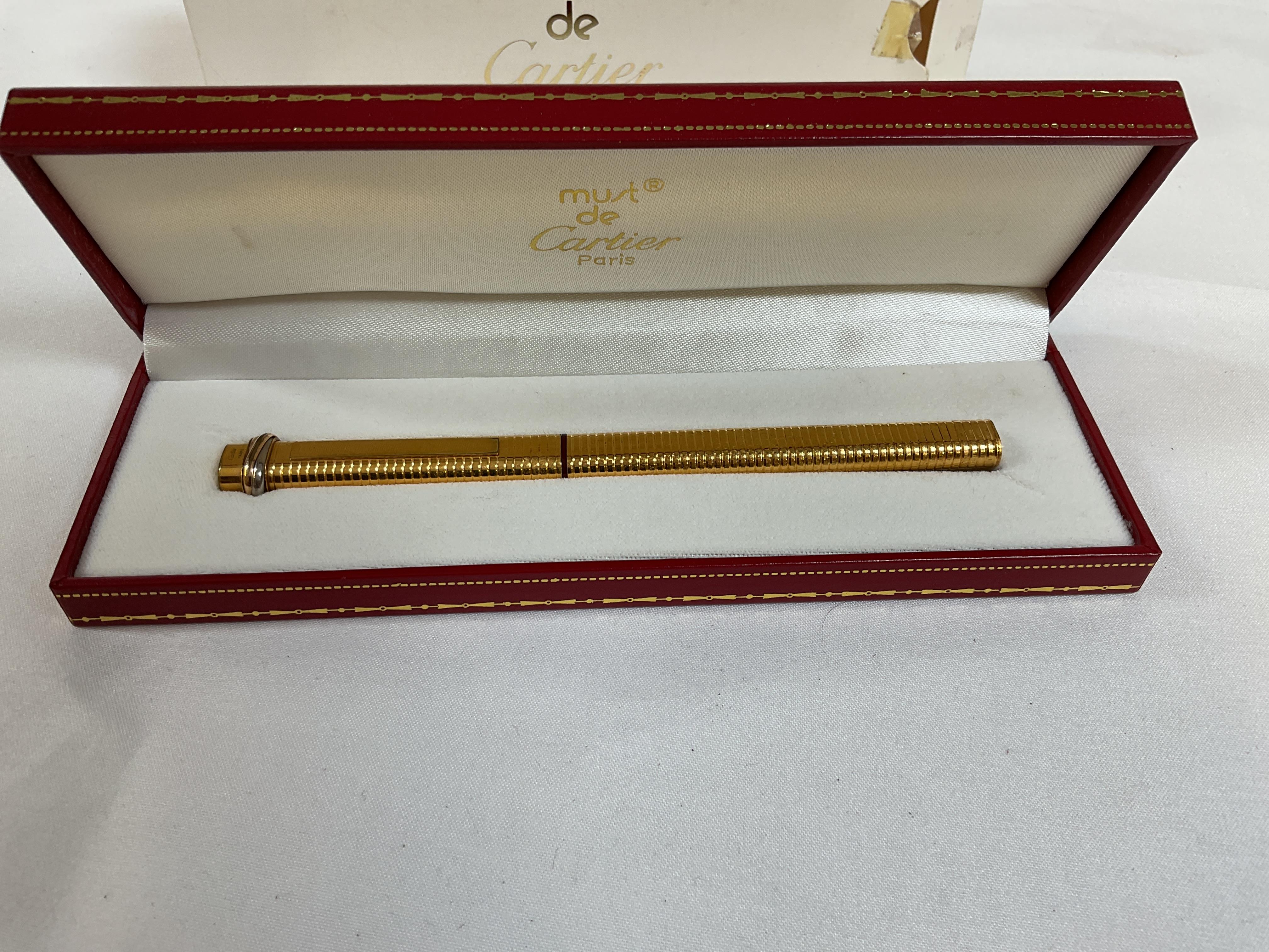 Lot 7 - A group of pens, including Must de Cartier, a