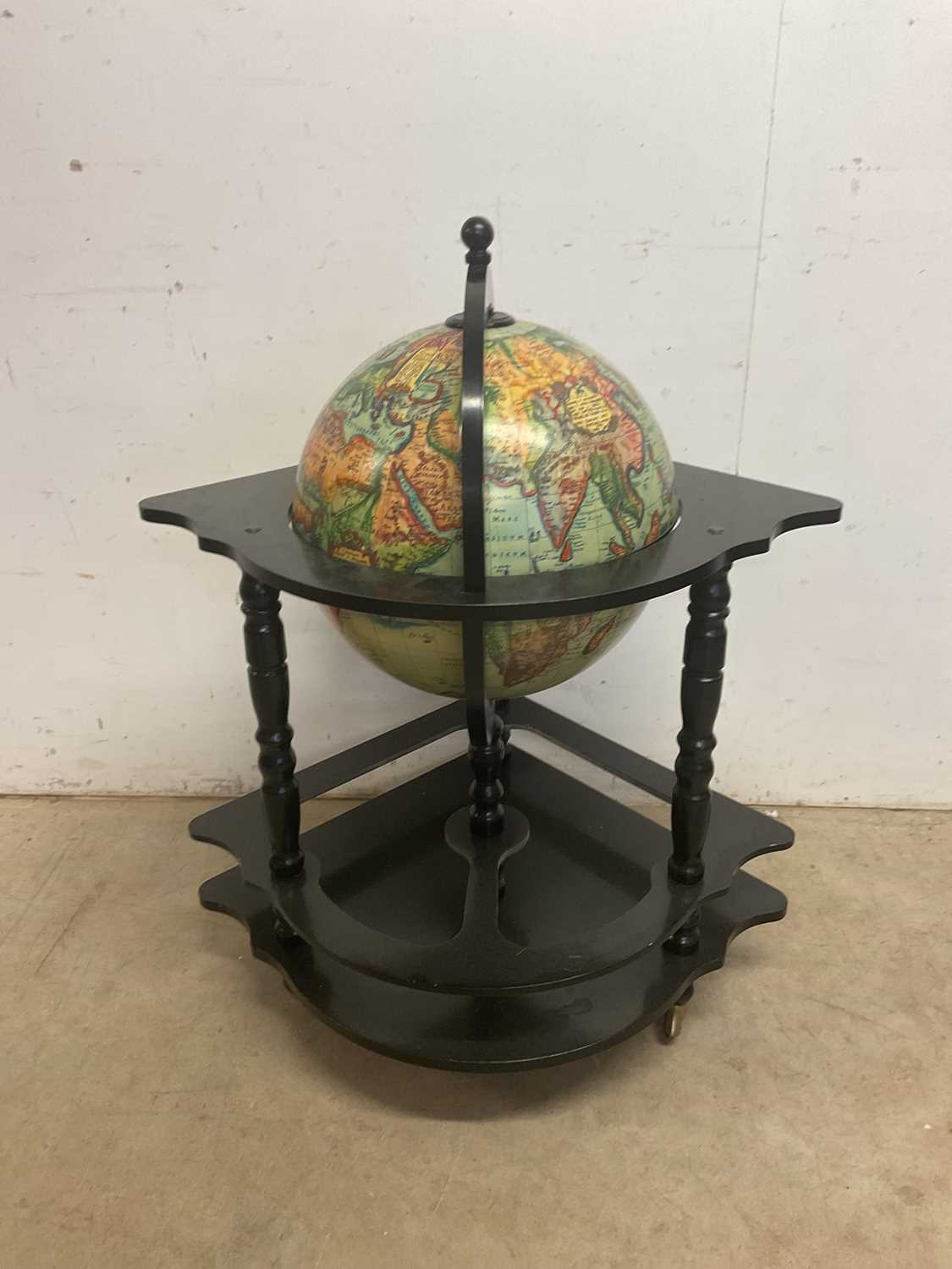 Lot 607 - A world Globe cocktail cabinet with gilded