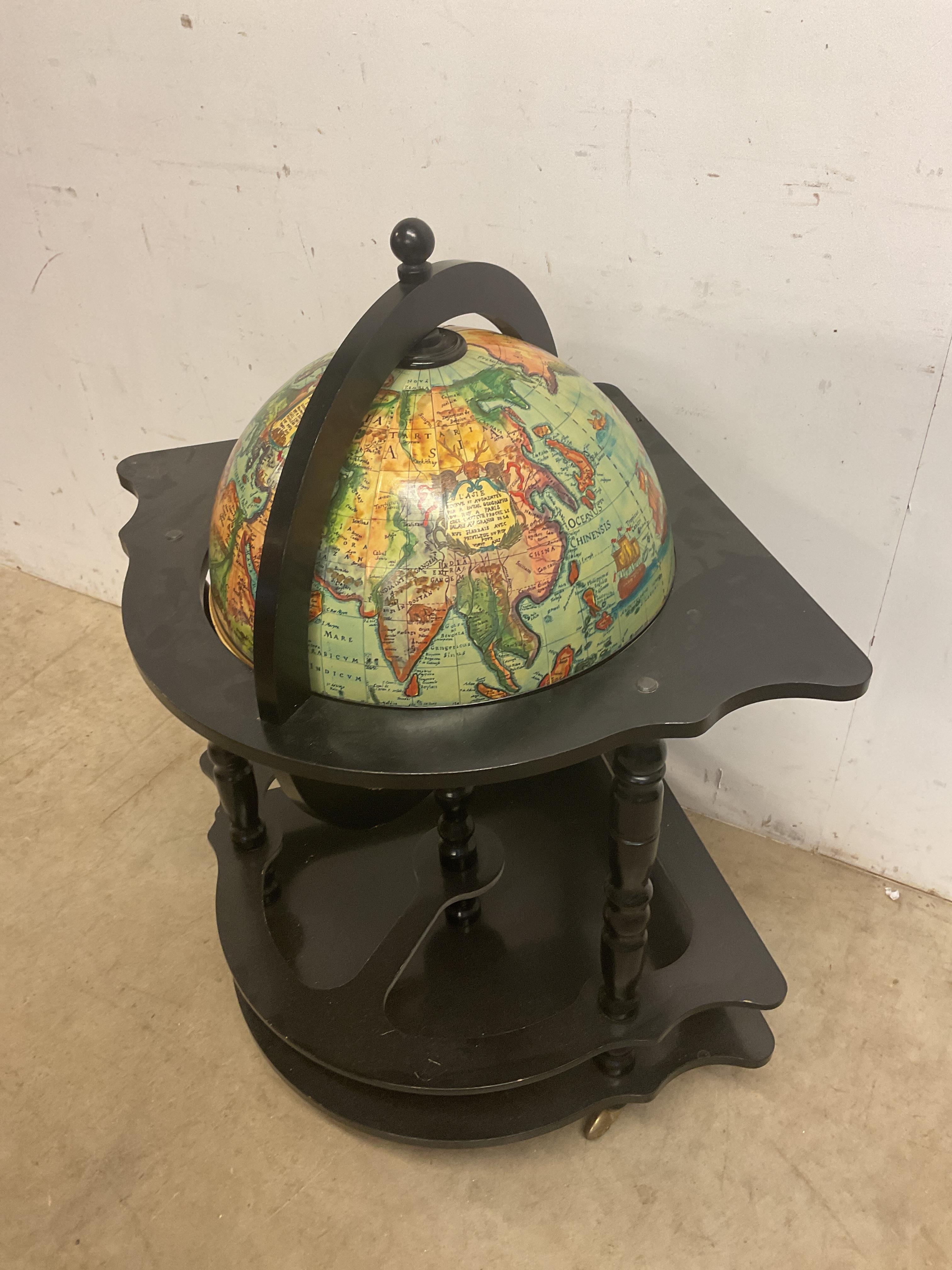 Lot 607 - A world Globe cocktail cabinet with gilded