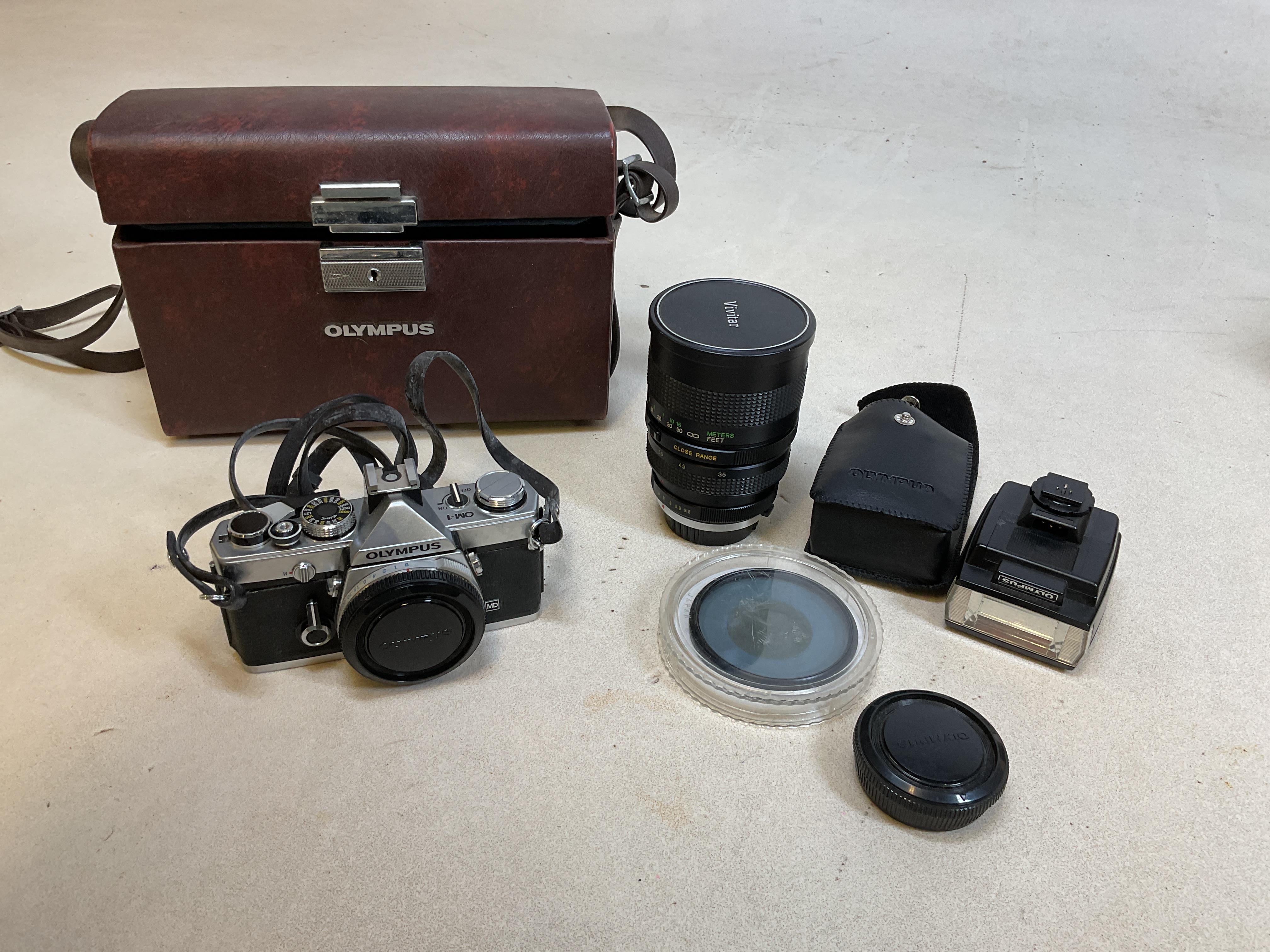 Lot 106 - An Olympus OM-1 camera in fitted case with