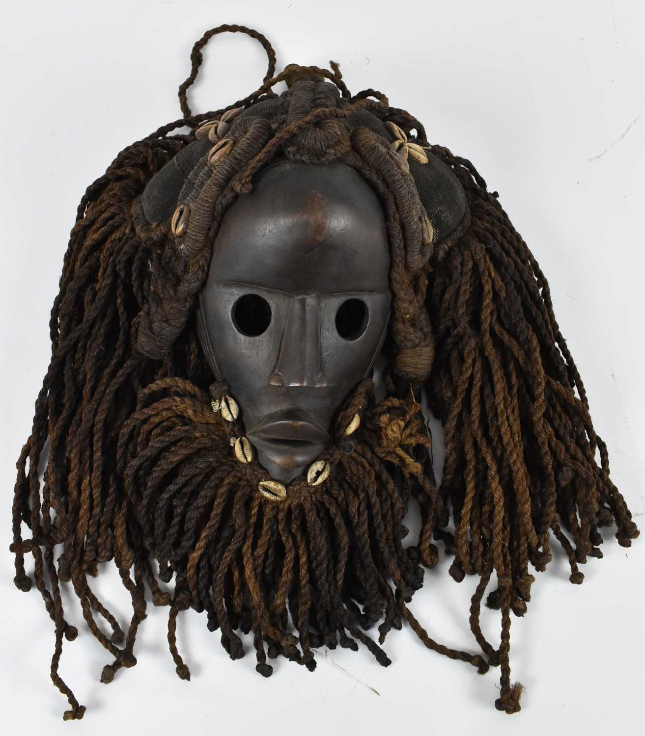 Lot 452 - TRIBAL ART; a Dan mask with hair and beard