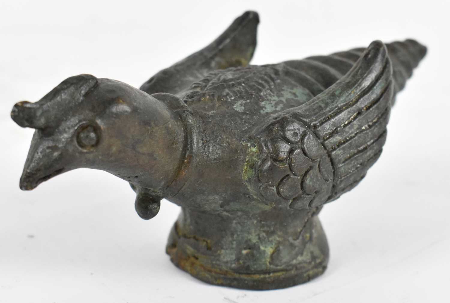 Lot 494 - A Chinese verdigris bronze figure of a bird,