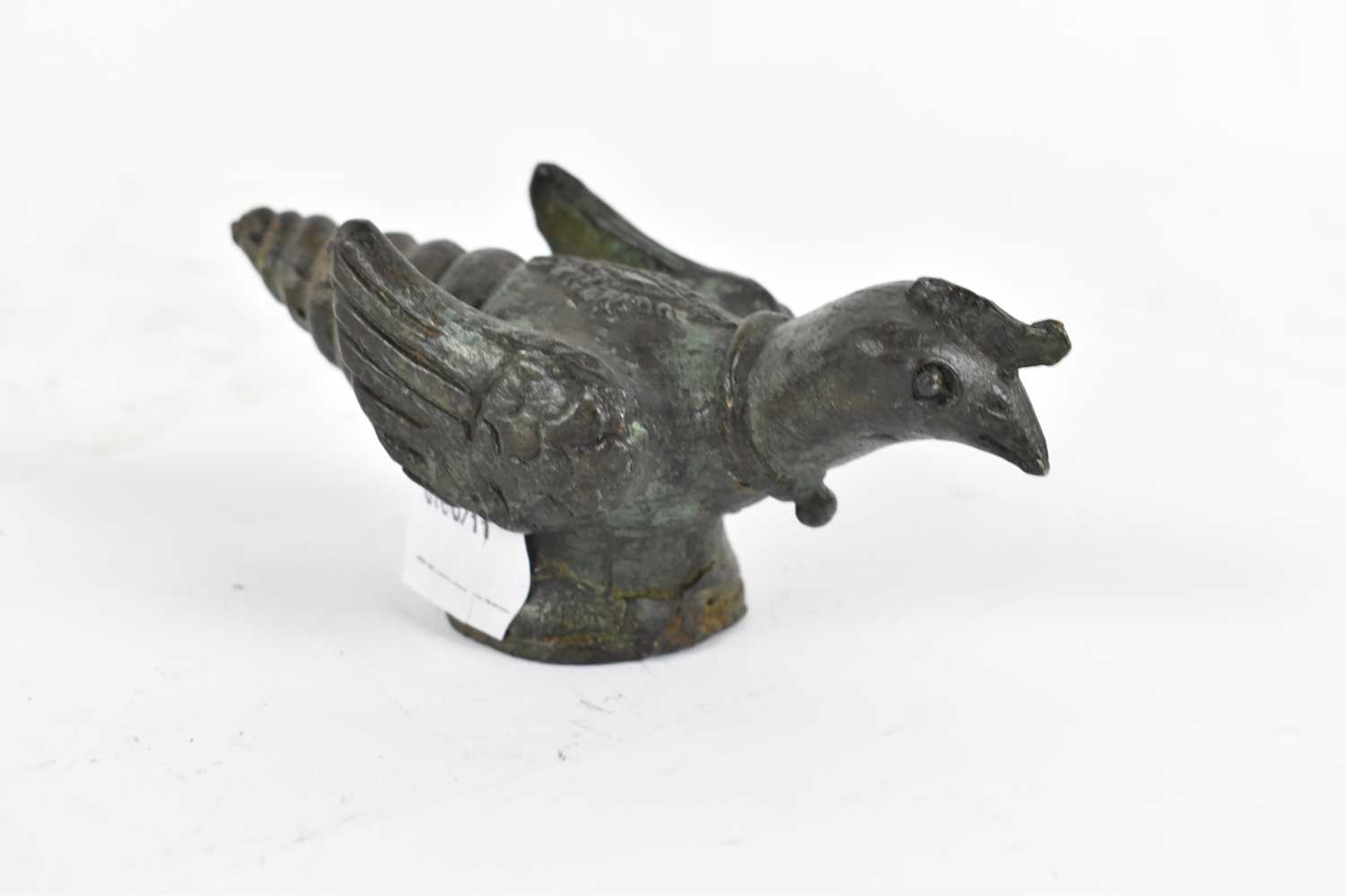 Lot 494 - A Chinese verdigris bronze figure of a bird,