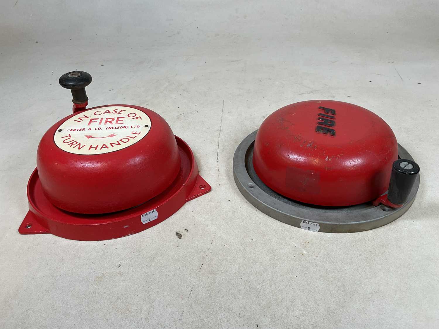 Lot 12 - Two vintage painted wall mounted fire bells,