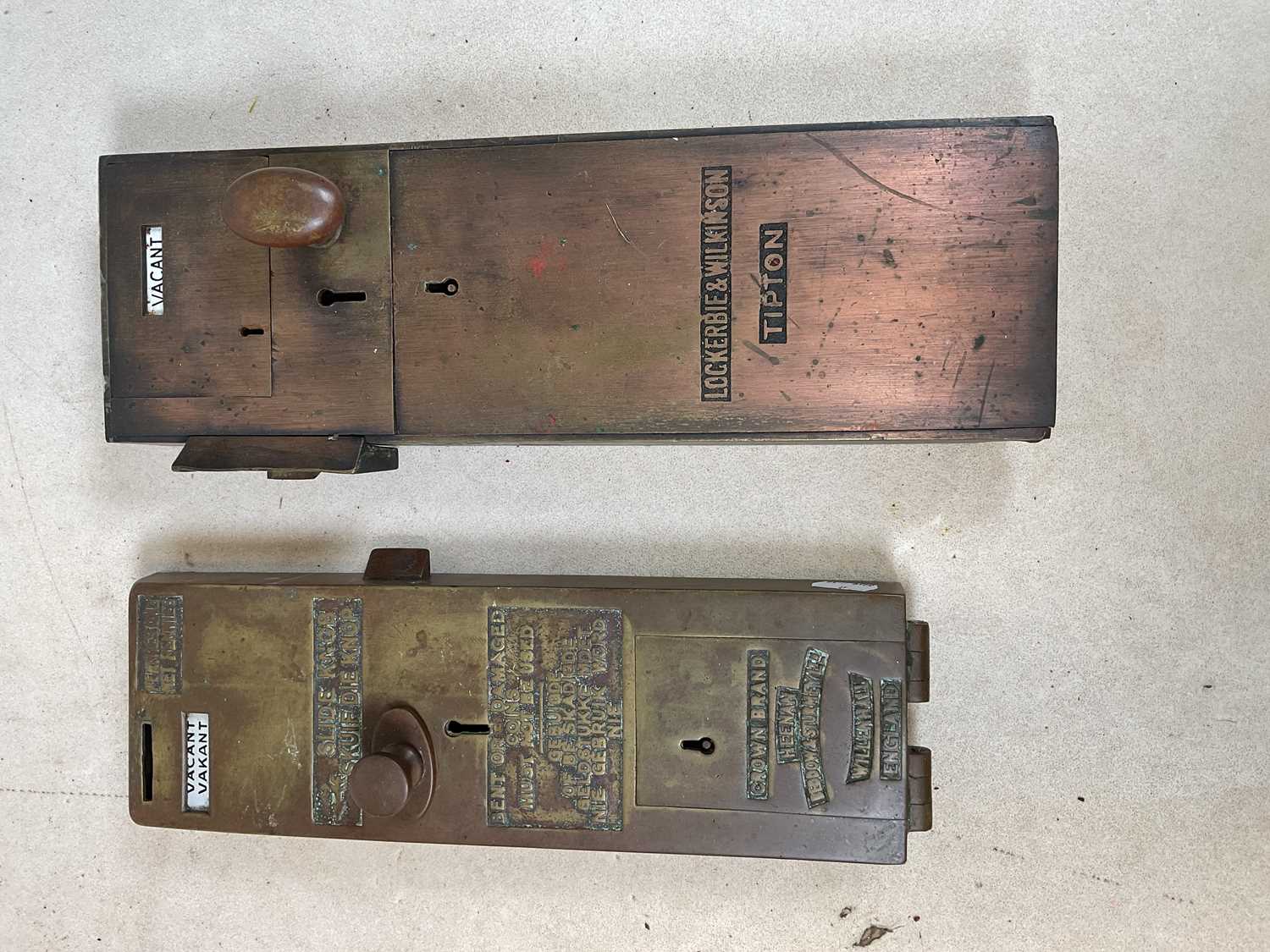 Lot 43 - Two vintage public toilet locks and inserts,