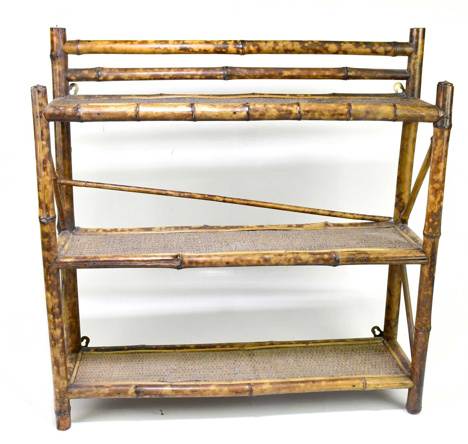 Lot 2476 - A free standing bamboo three tier shelf,