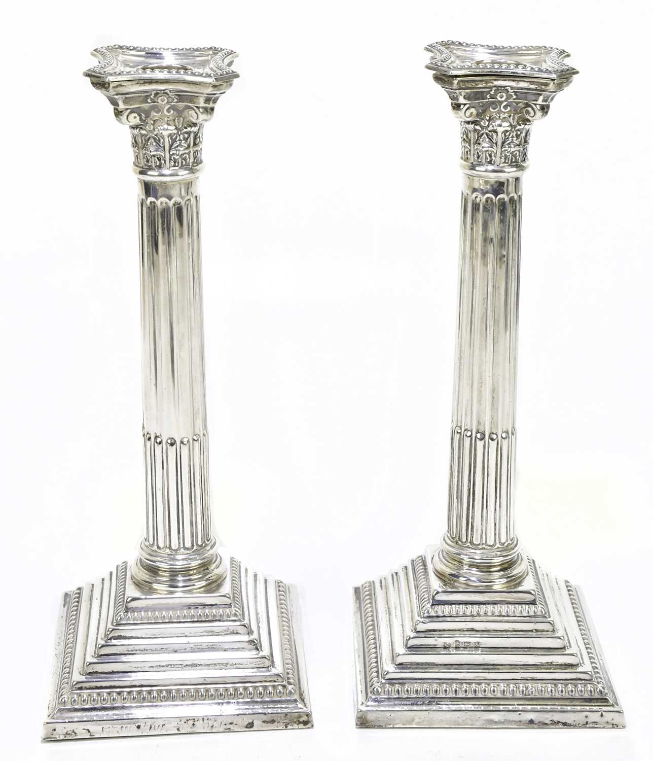 Lot 1100 - A large pair of loaded hallmarked silver