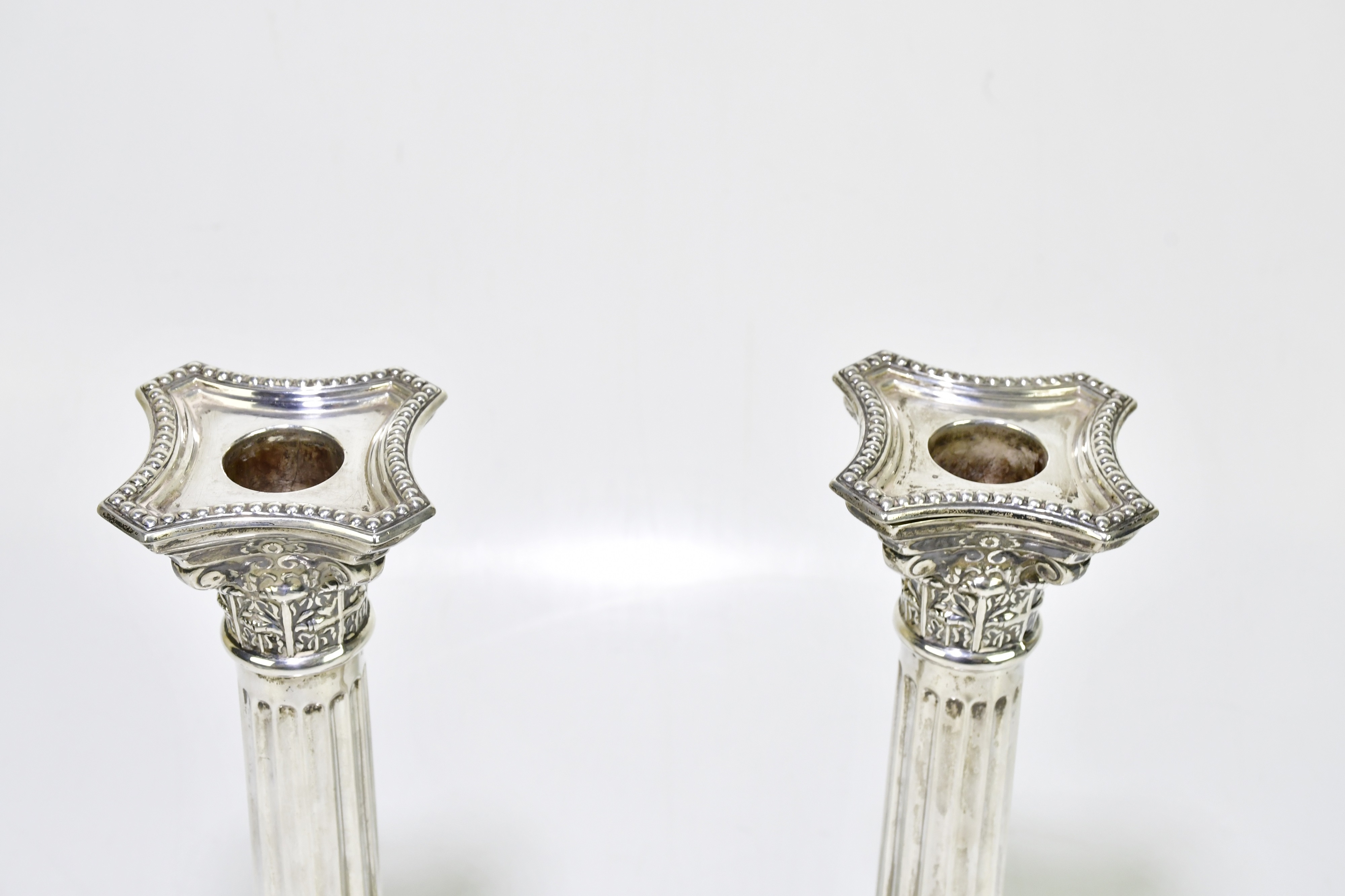 Lot 1100 - A large pair of loaded hallmarked silver
