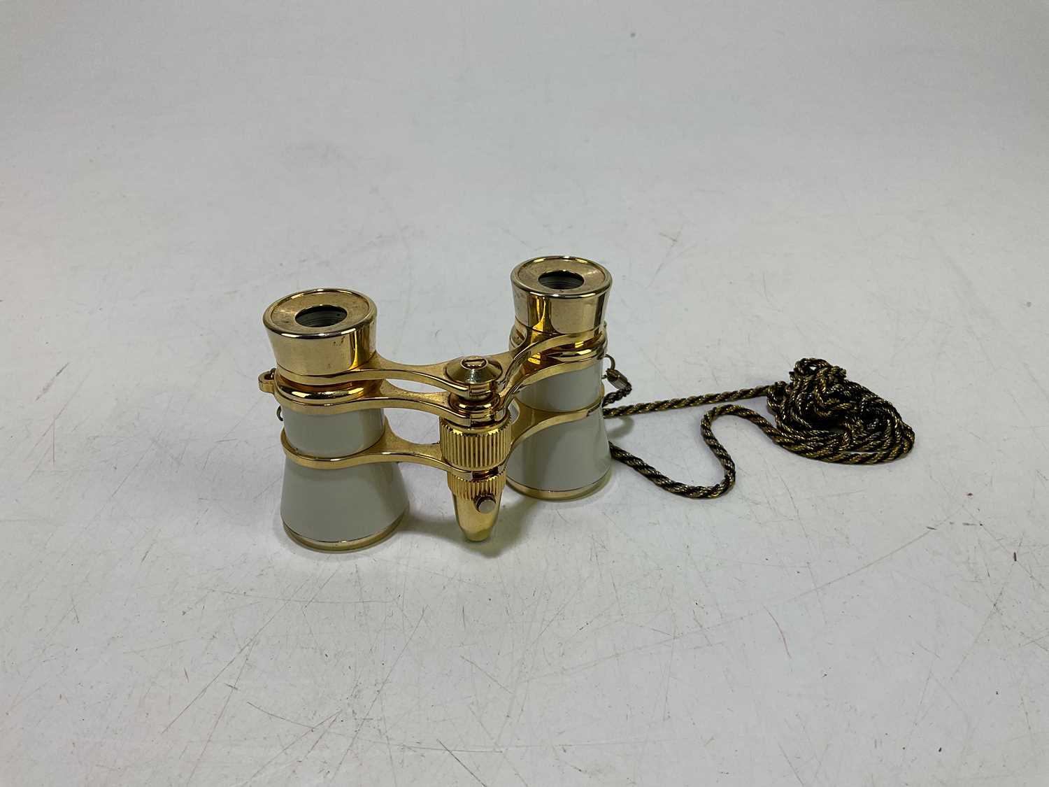 Lot 2059 - A pair of modern white and gilt metal opera