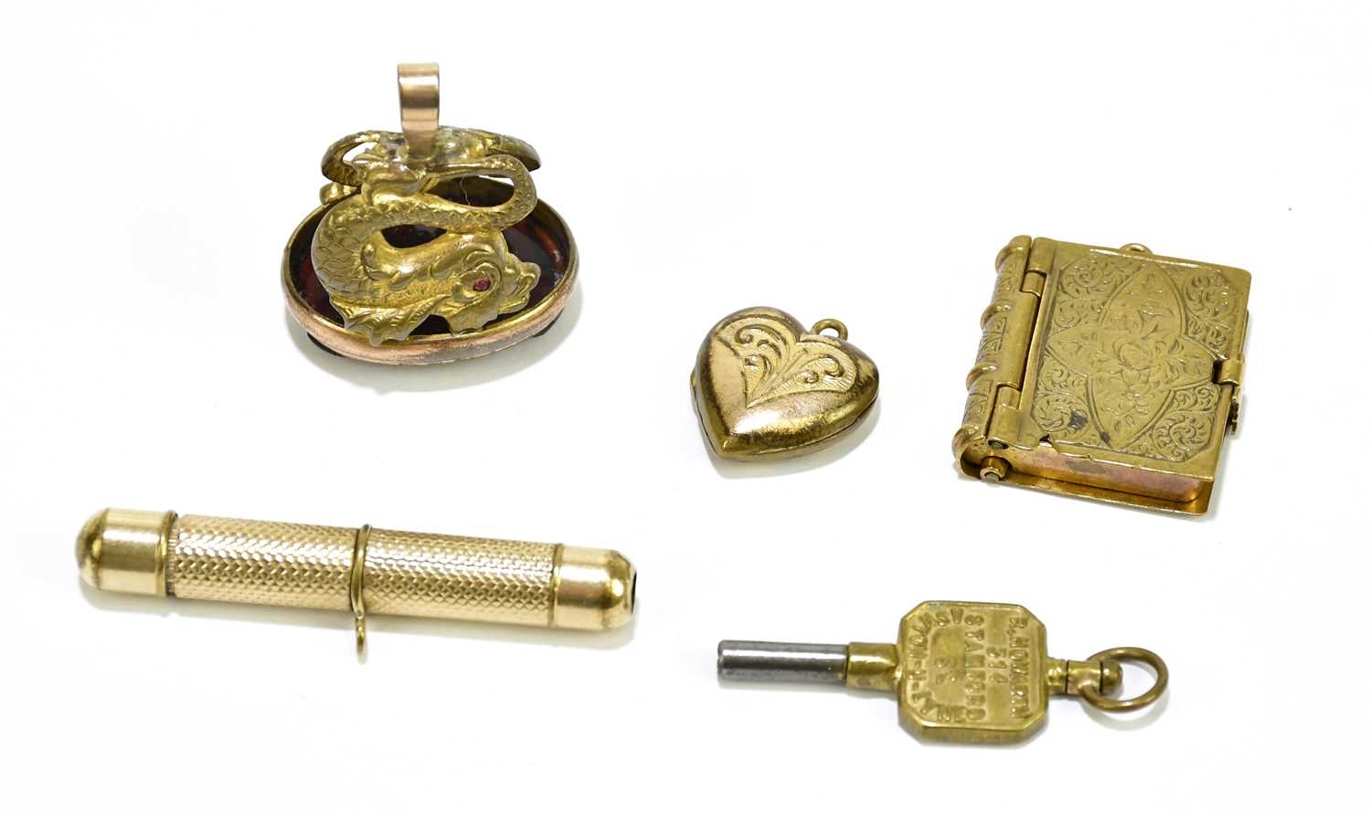 Lot 2083 - W.S. NICKS; a yellow metal pull-out