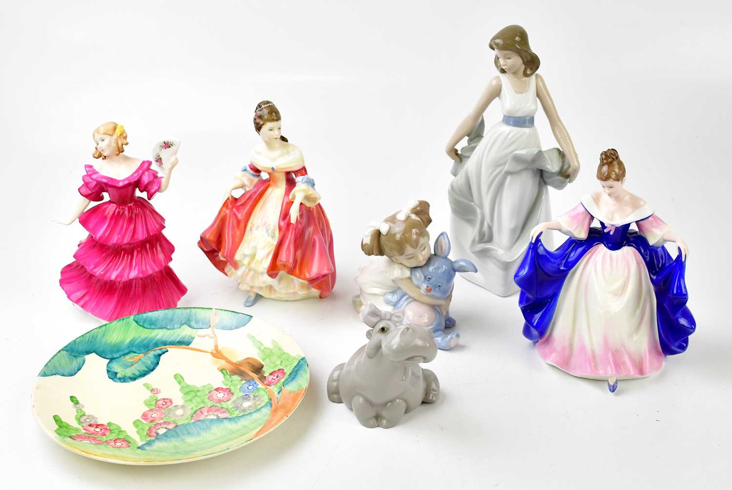 Lot 1718 - CLARICE CLIFF; a hand painted circular