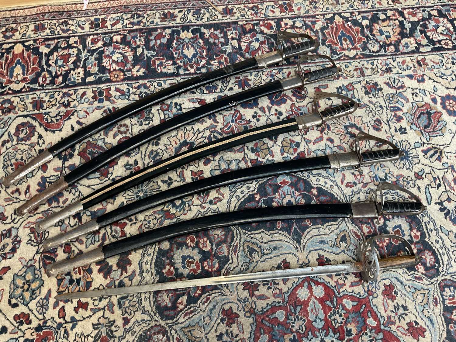 Lot 2154 - A group of six replica cutlasses, five with