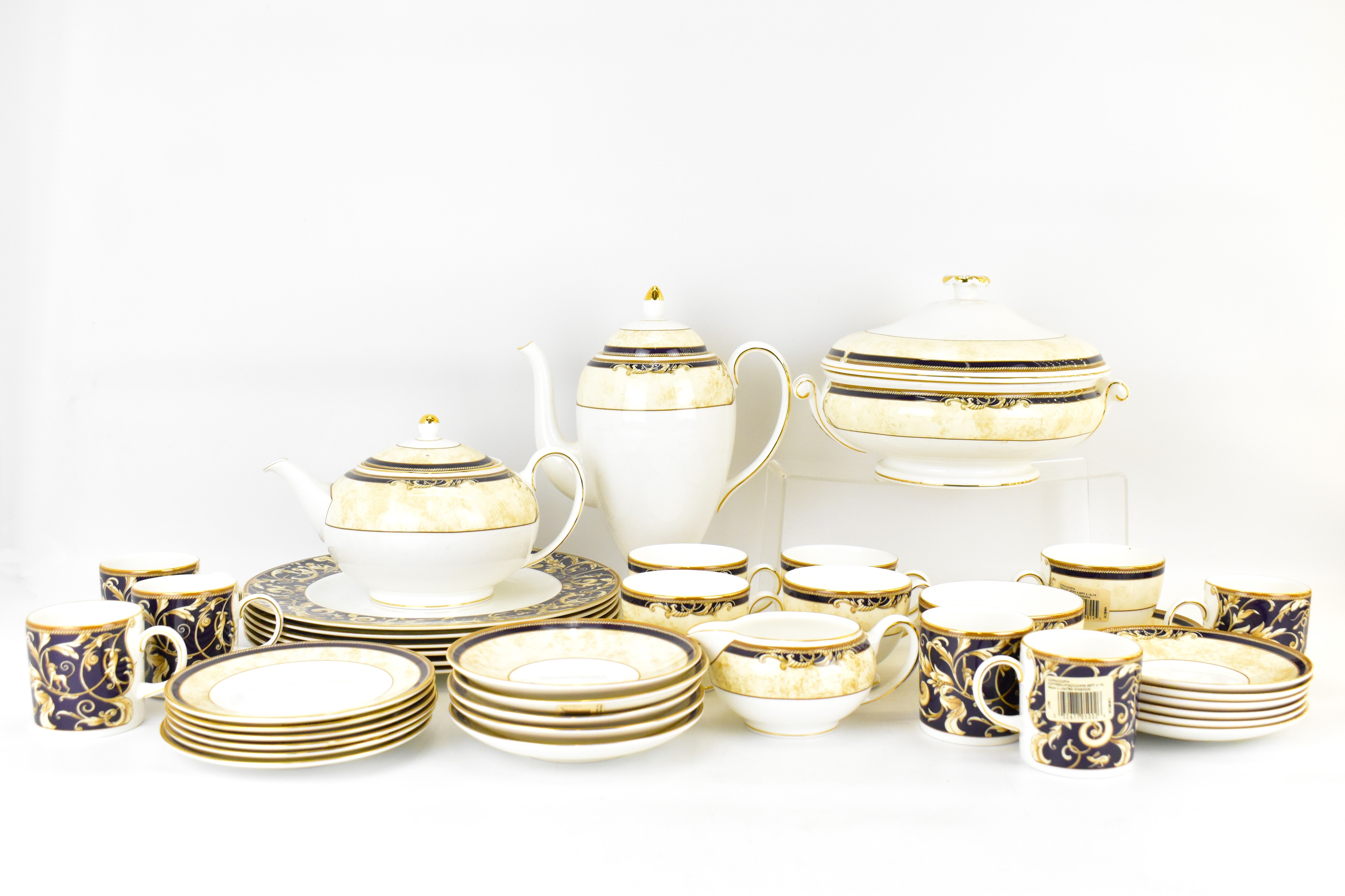 Lot 436 - WEDGWOOD; a forty-piece 'Cornucopia' pattern