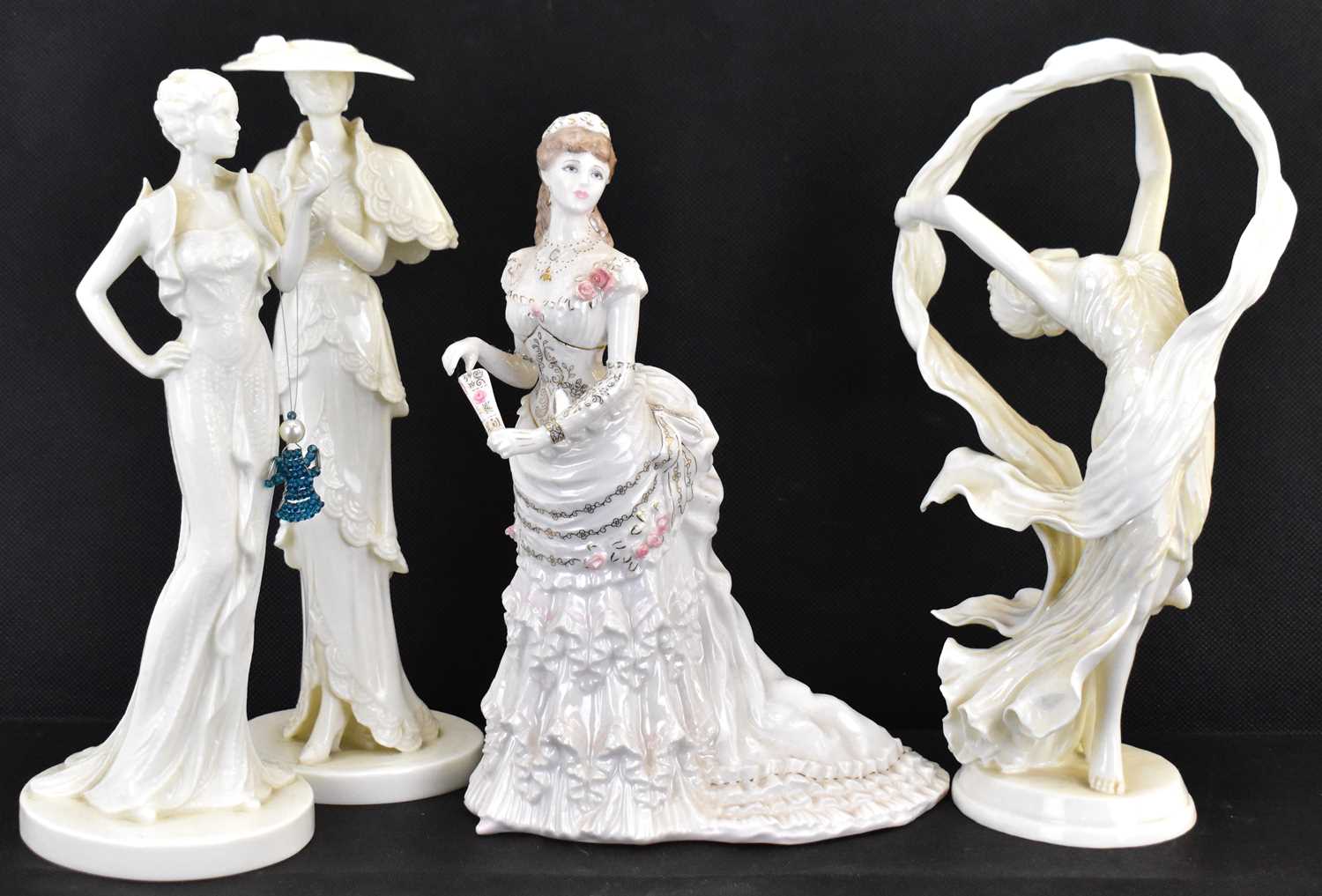 Lot 453 - COALPORT; two collectible figures comprising