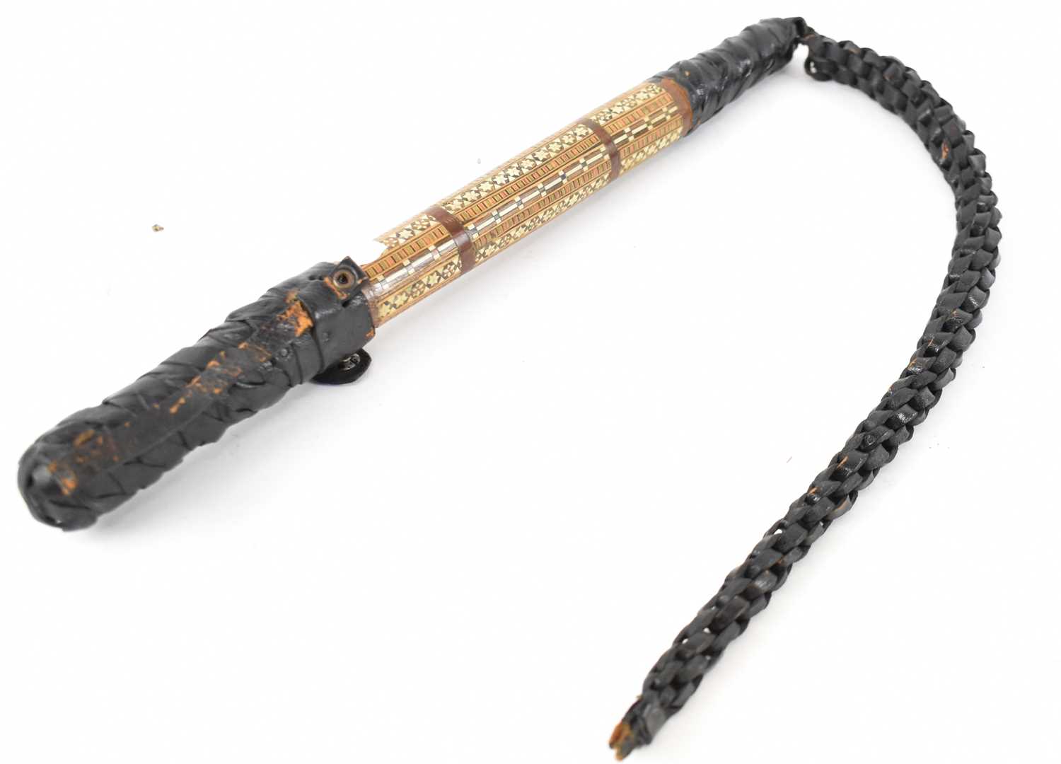 Lot 220 - An Eastern camel whip with leather and