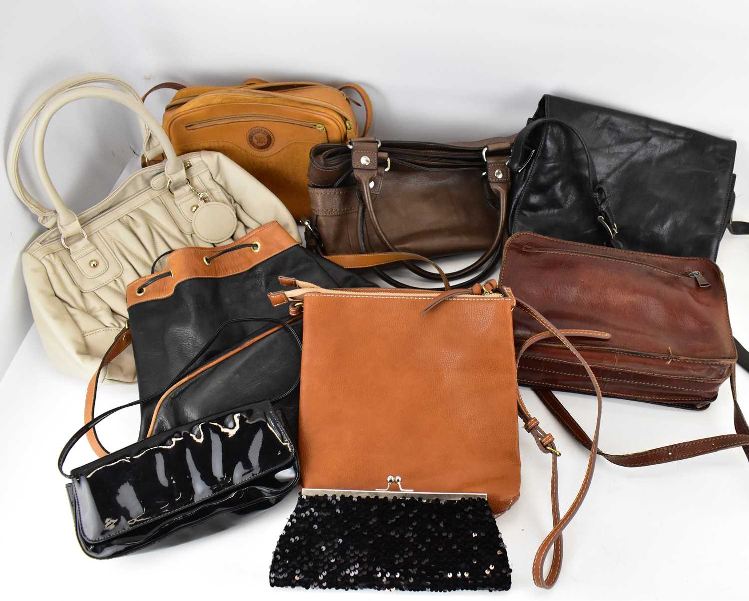 Lot 360 - Nine ladies' handbags of various colours,