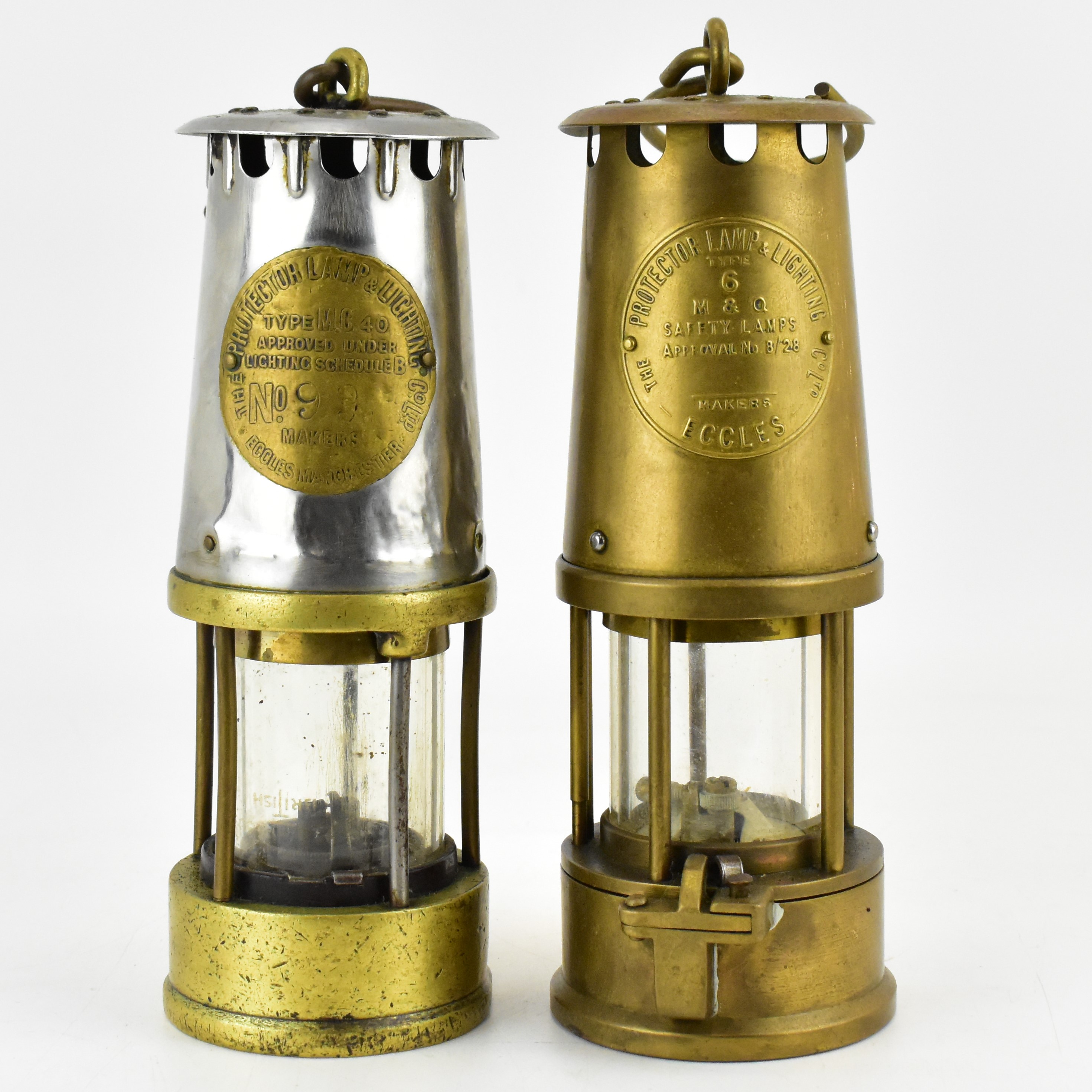Lot 197 - Two vintage miners' lamps, both titled 'The