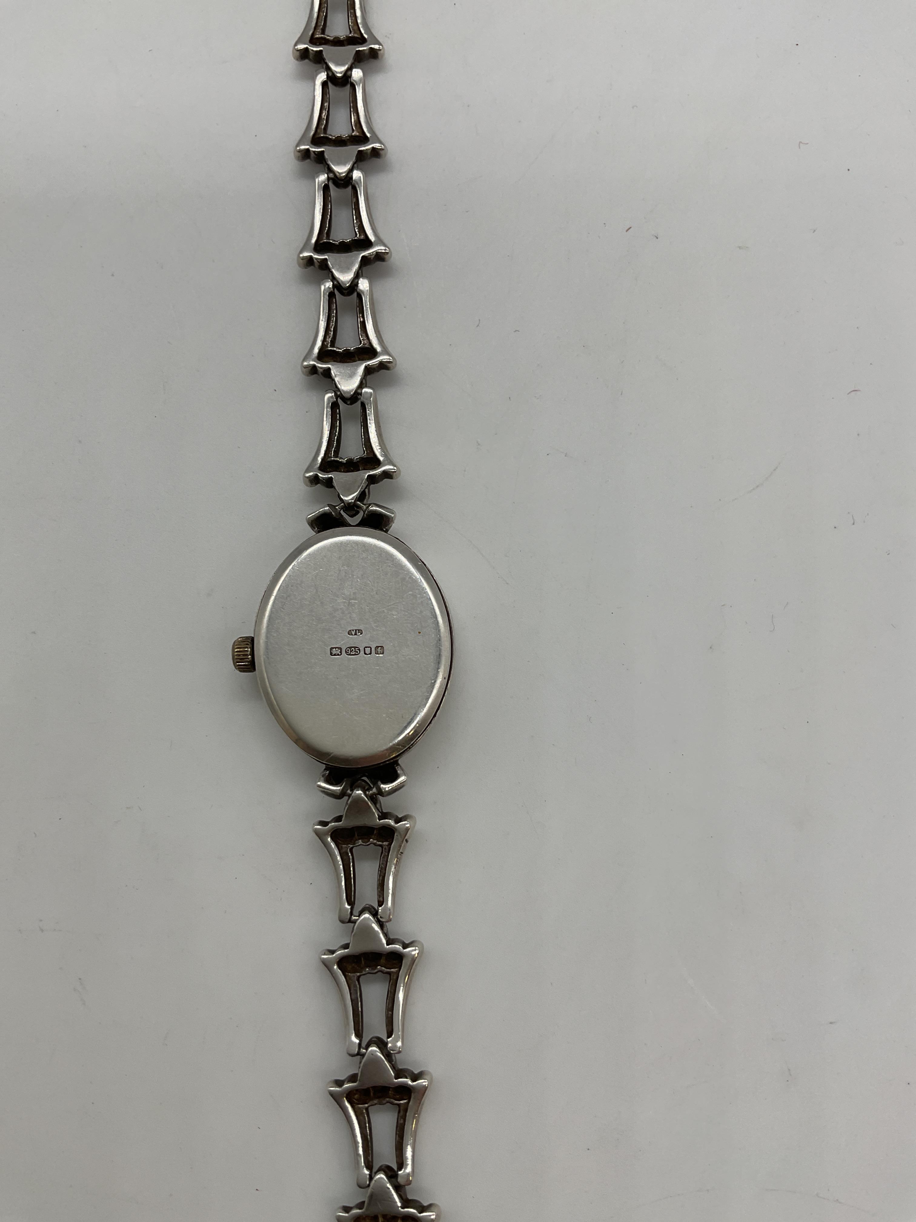 Lot 1307 - MARCO VALENTINO; a lady's silver quartz