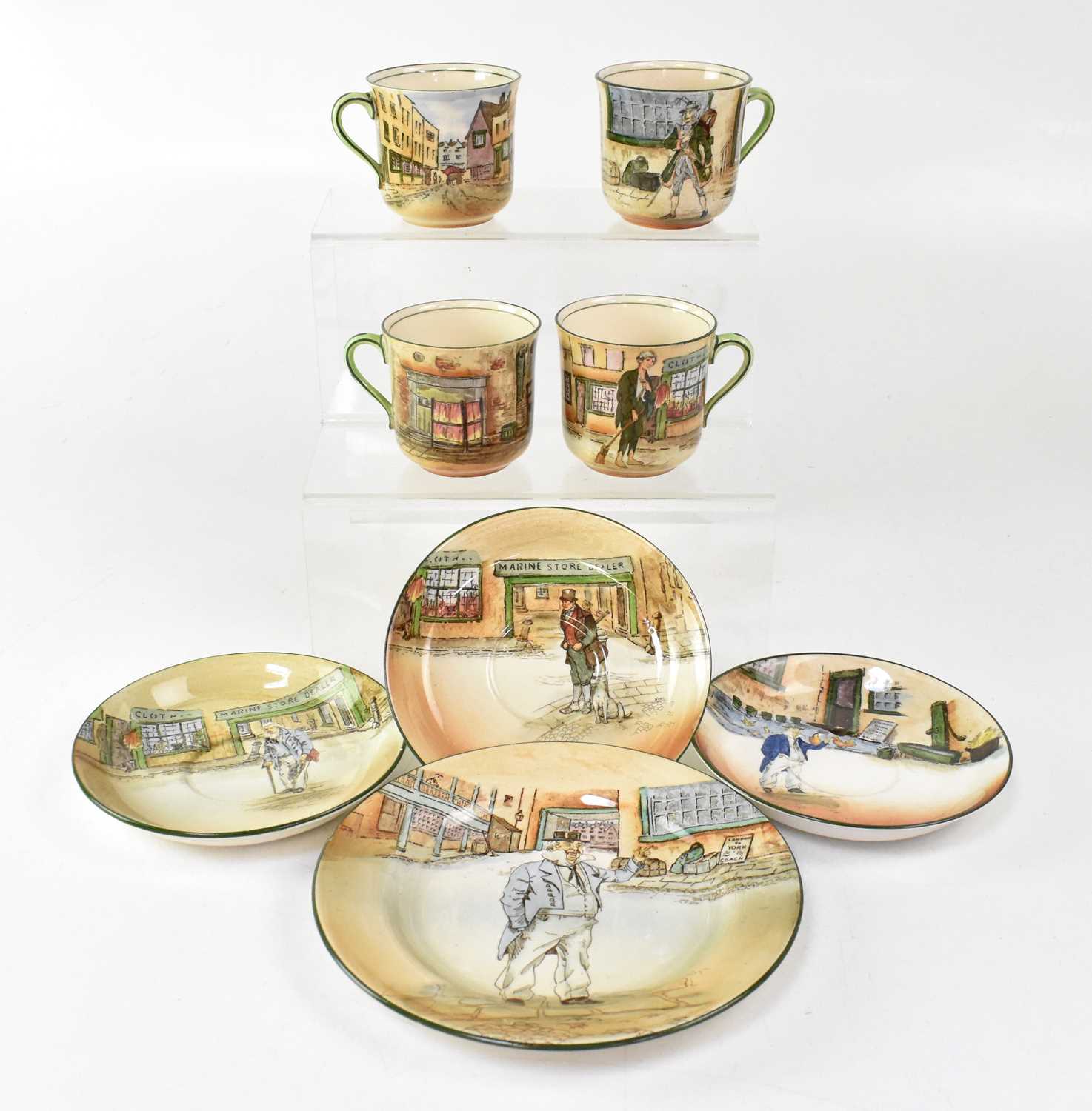 Lot 396 - ROYAL DOULTON; four Dickens series ware cups,