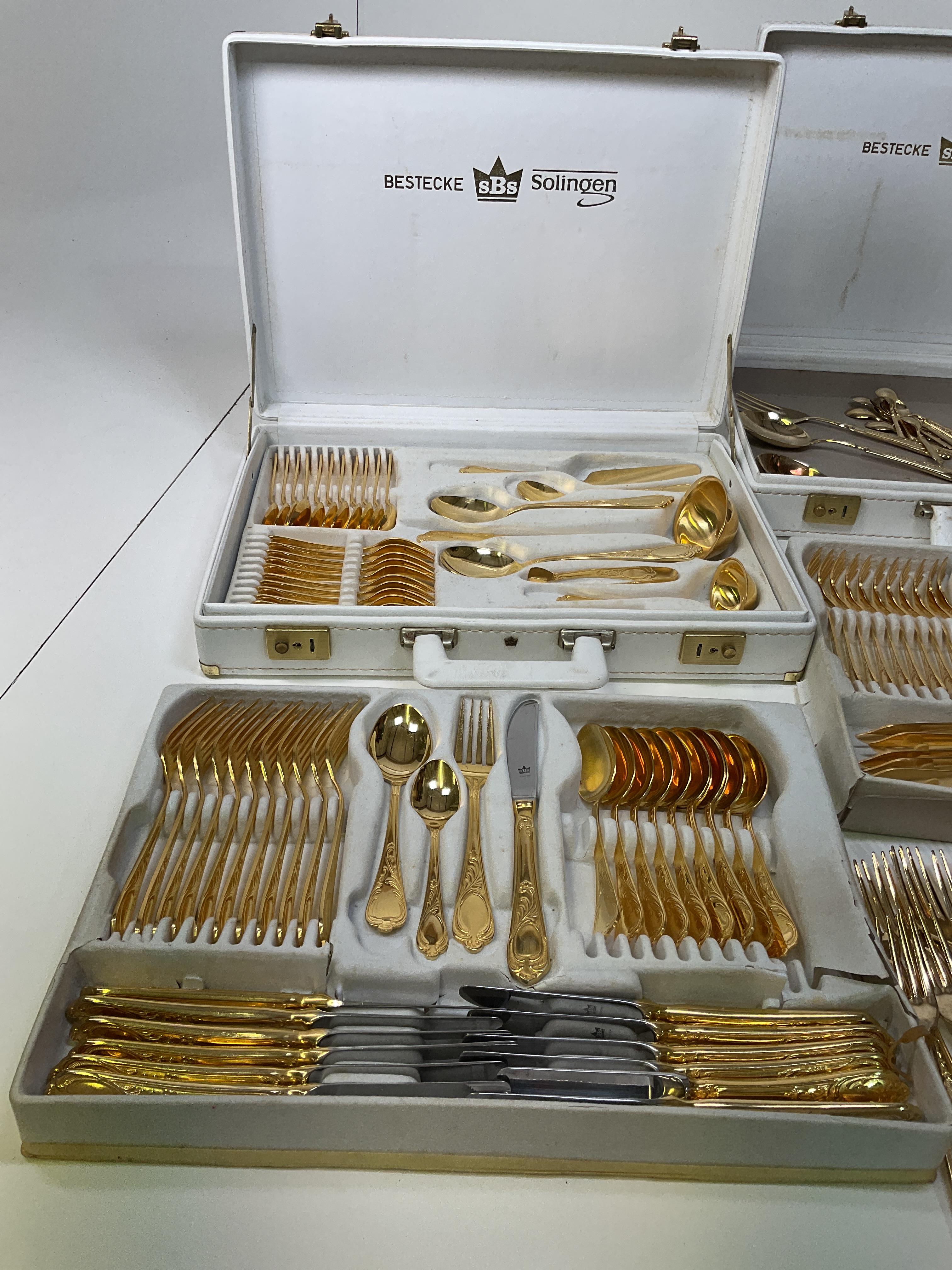 Lot 1006 - Two cases of Solingen gold plated cutlery
