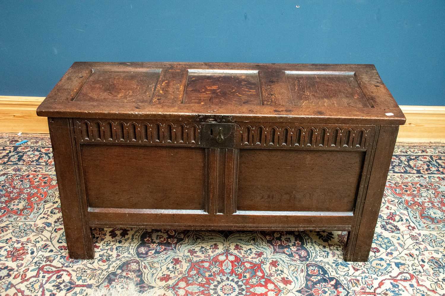 Lot 2543 - An 18th century oak coffer, width 125cm.