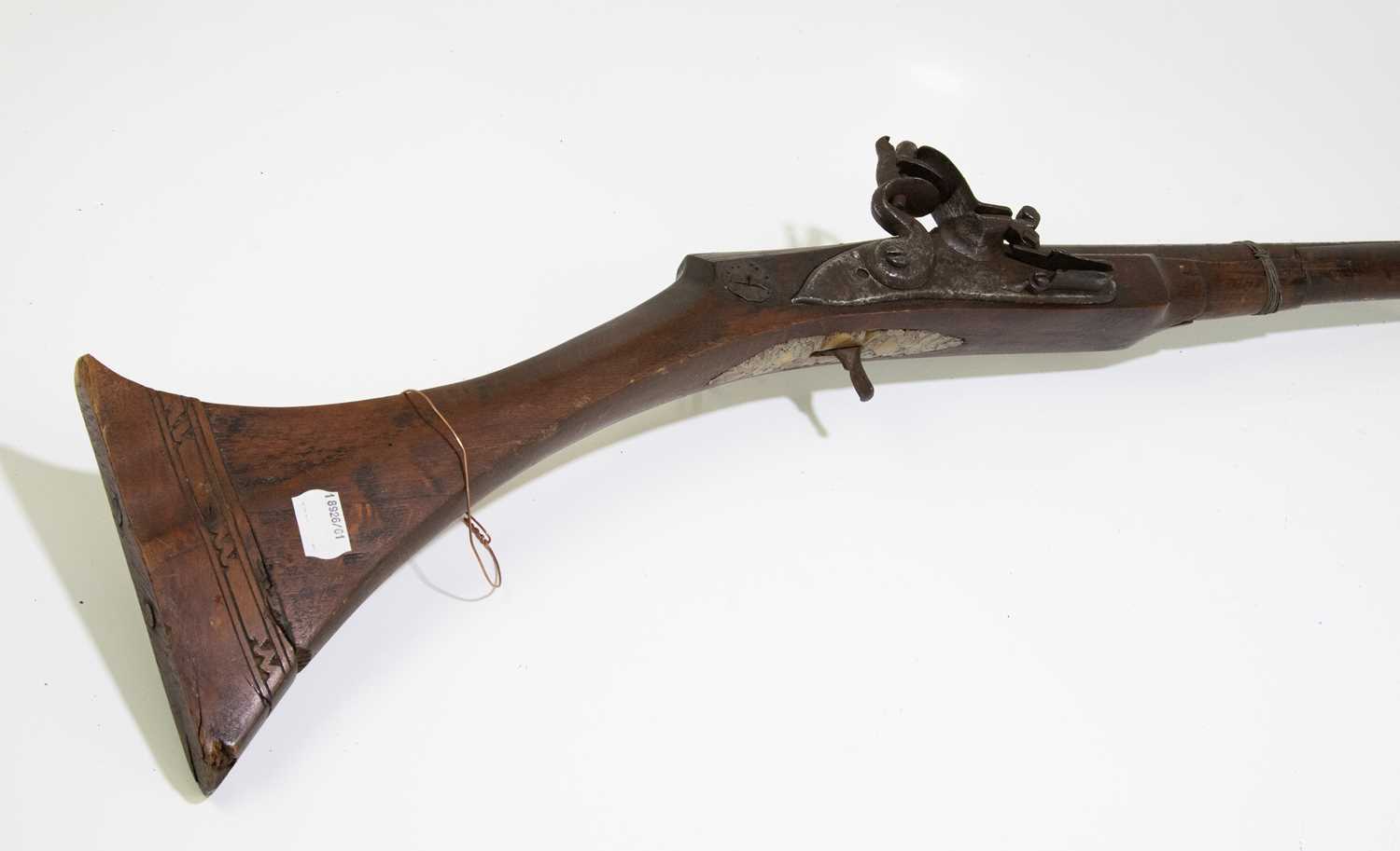 Lot 575 - An 18th century Eastern flintlock musket,
