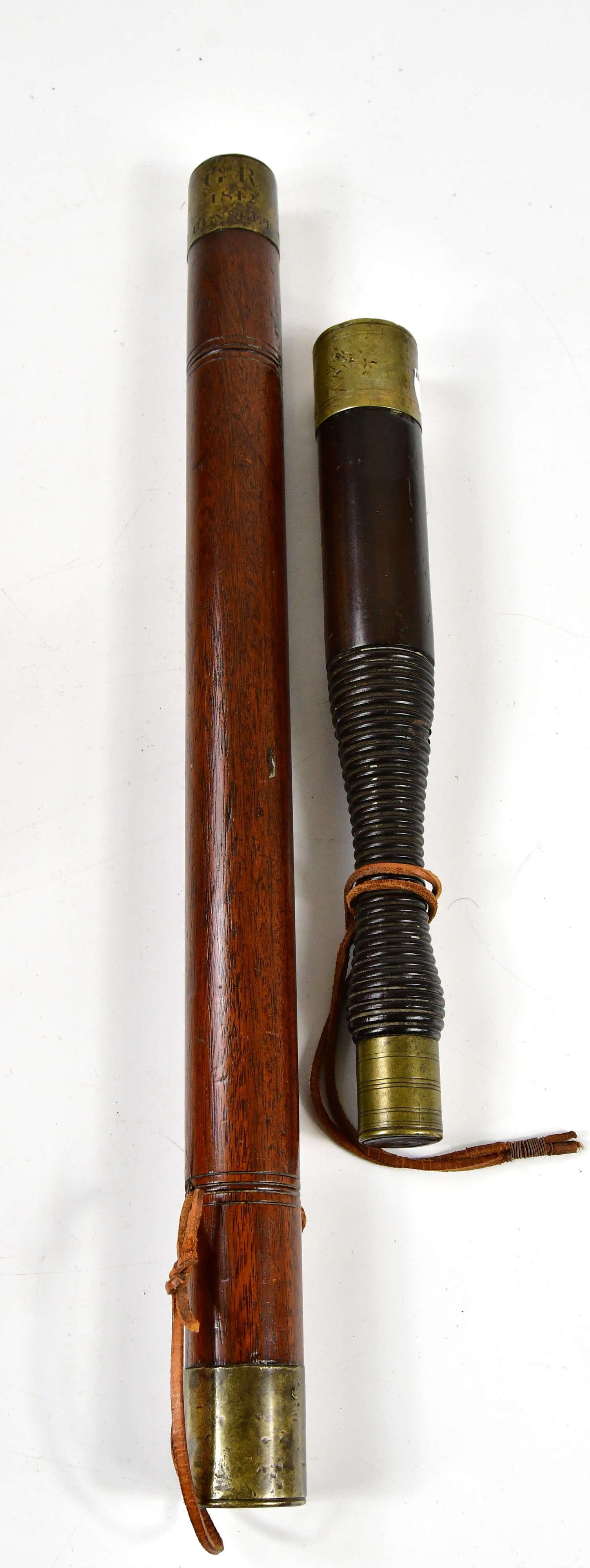 Lot 413 - A Georgian brass mounted truncheon inscribed