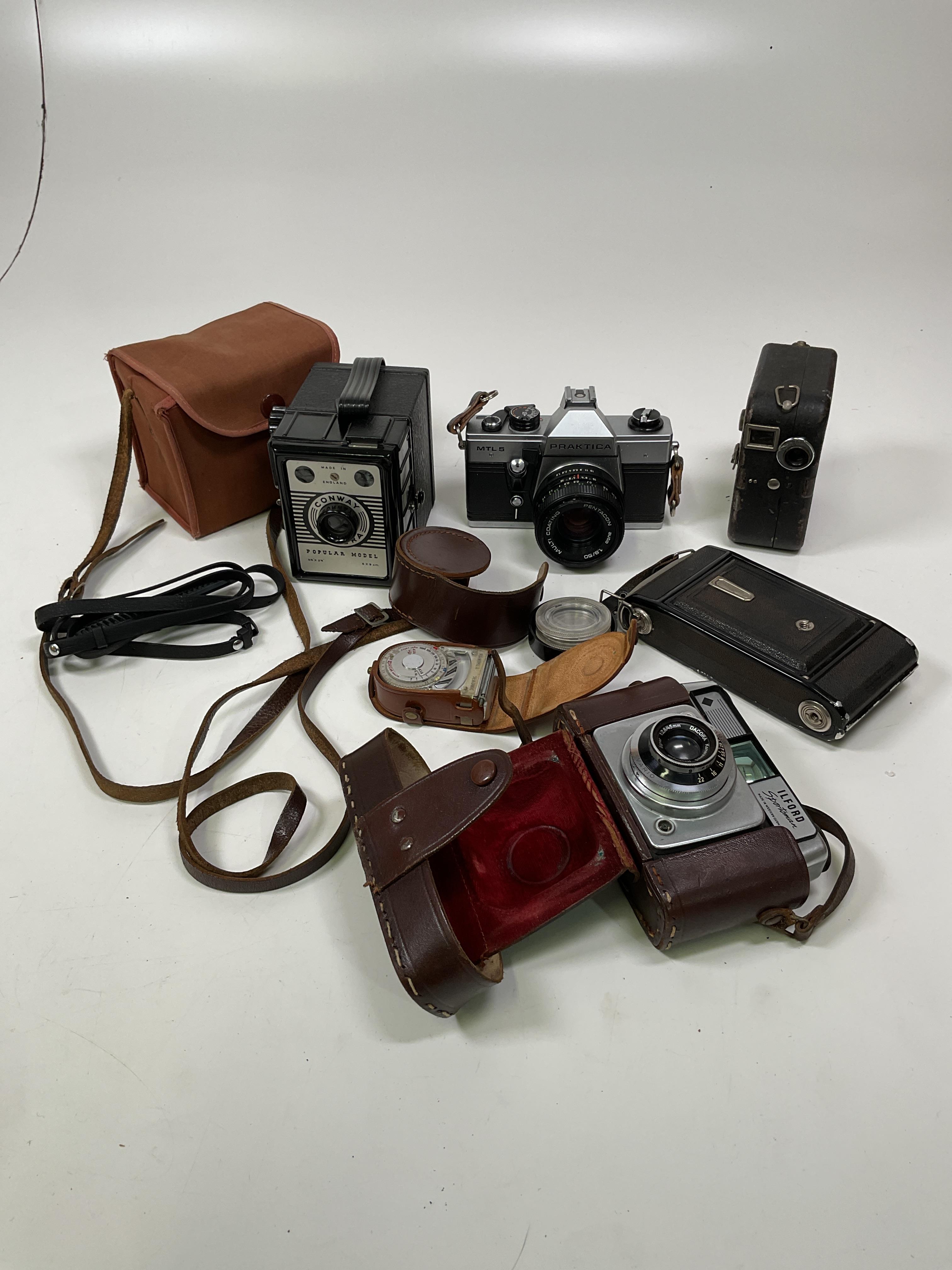 Lot 25 - A small group of cameras, a GPO compass,