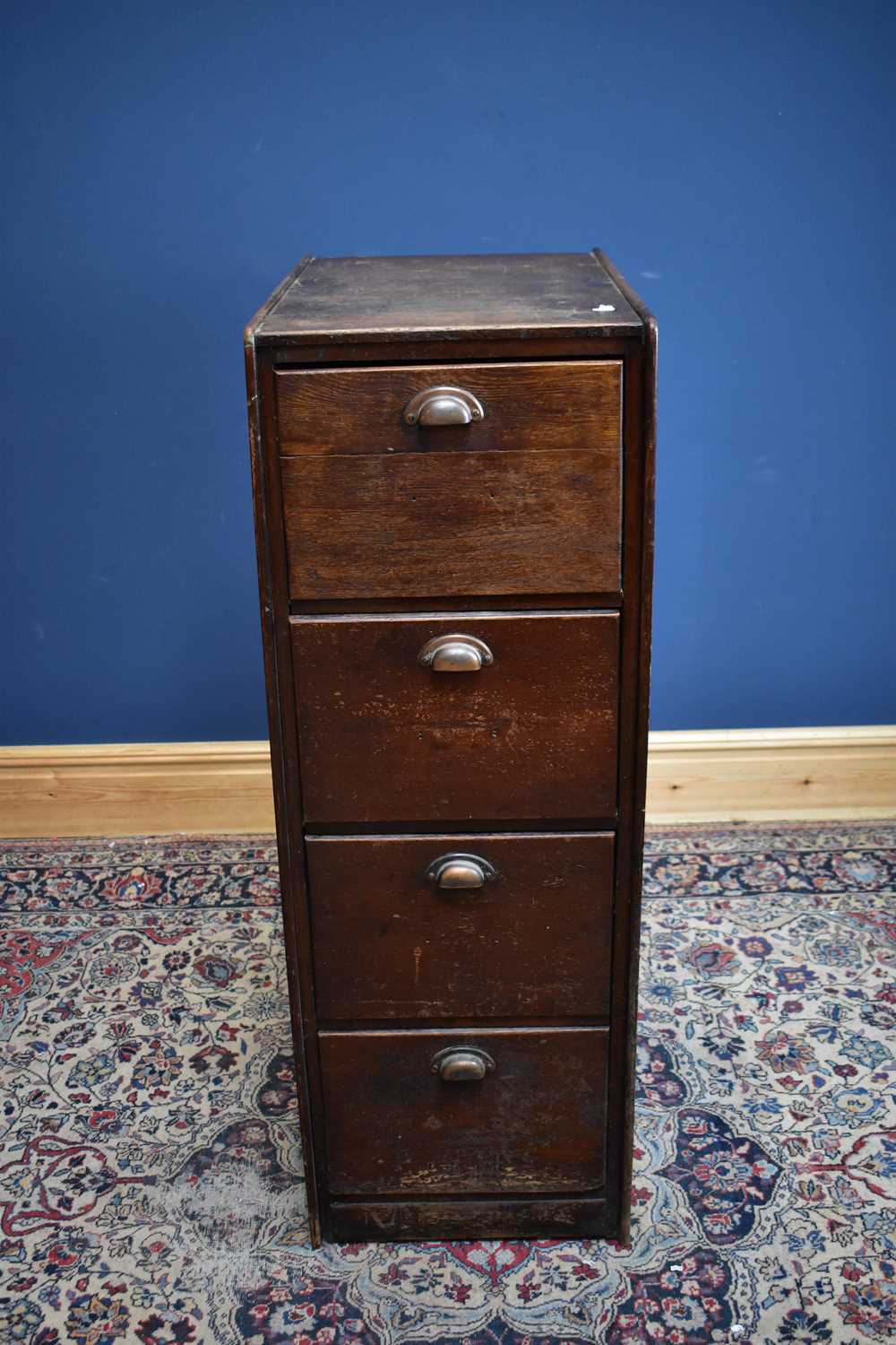 Lot 2373 - An oak four drawer filing cabinet, height