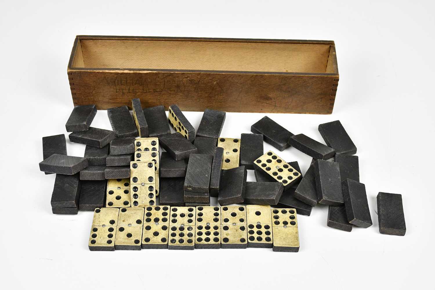 Lot 1108 - A cased Victorian set of dominoes.