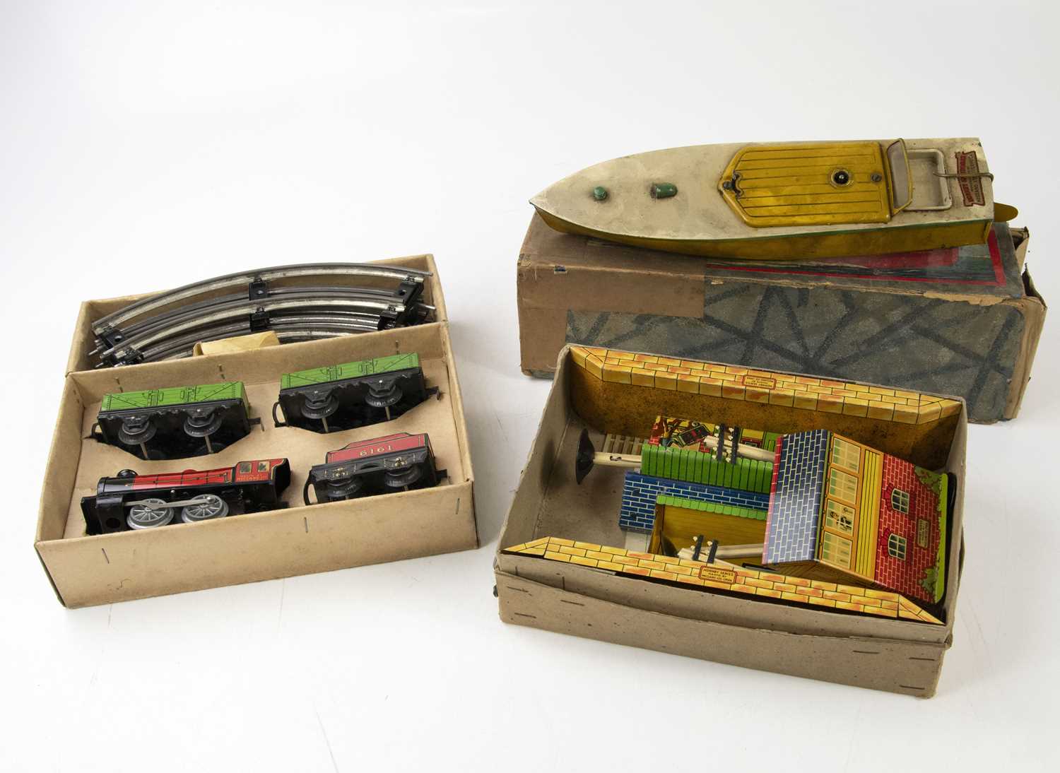 Lot 1098 - HORNBY; a tin plate train set with track
