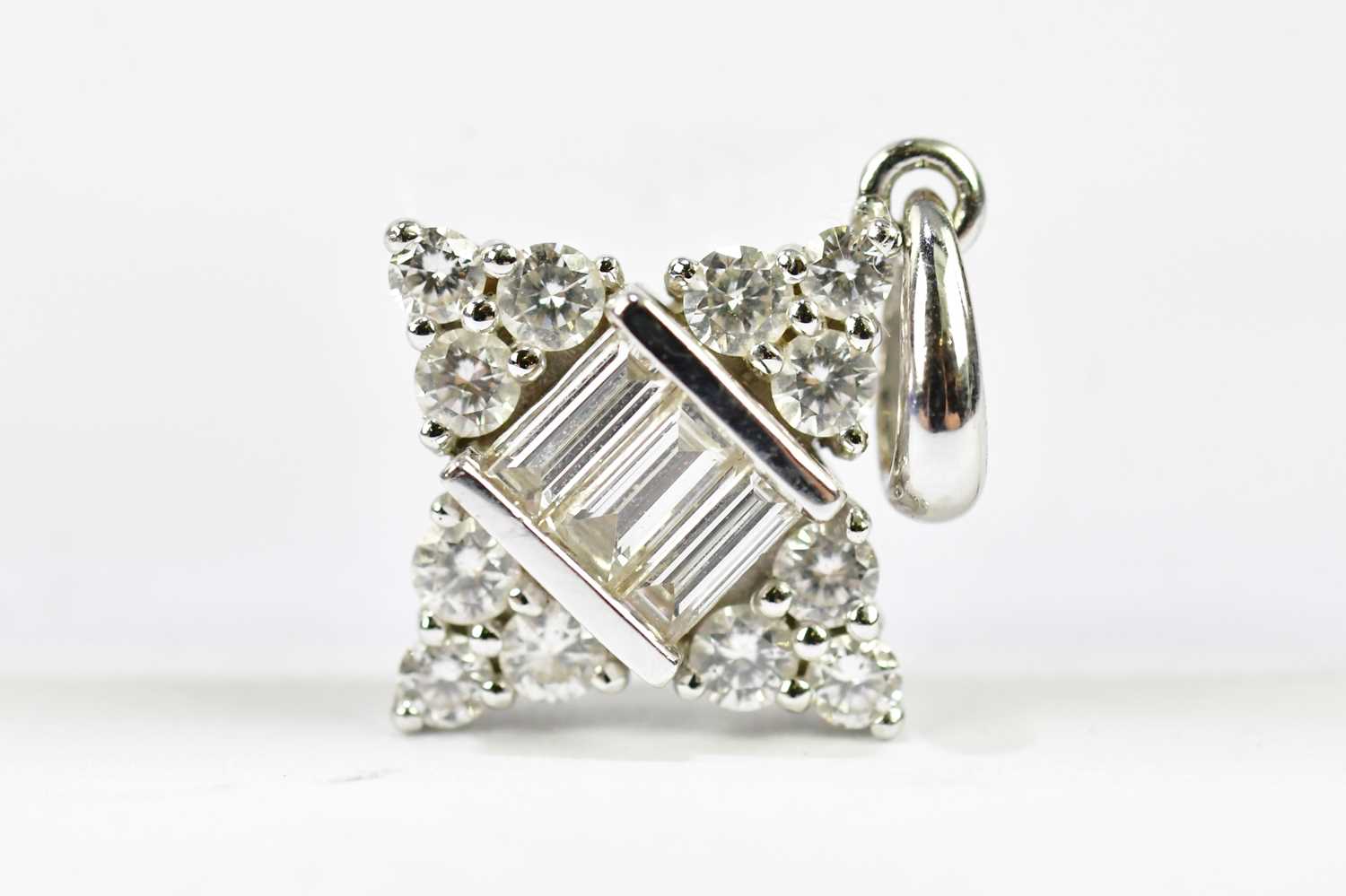 Lot 347 - A white metal diamond lozenge shaped pendant