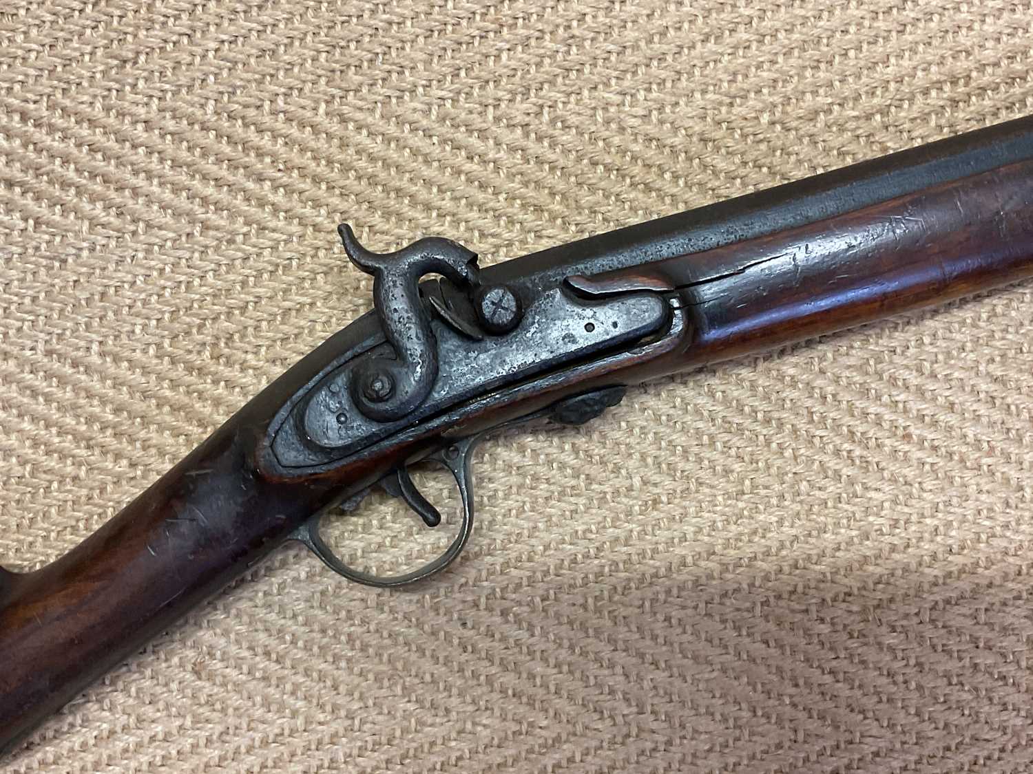 Lot 72 - A 19th Century flintlock rifle with mahogany