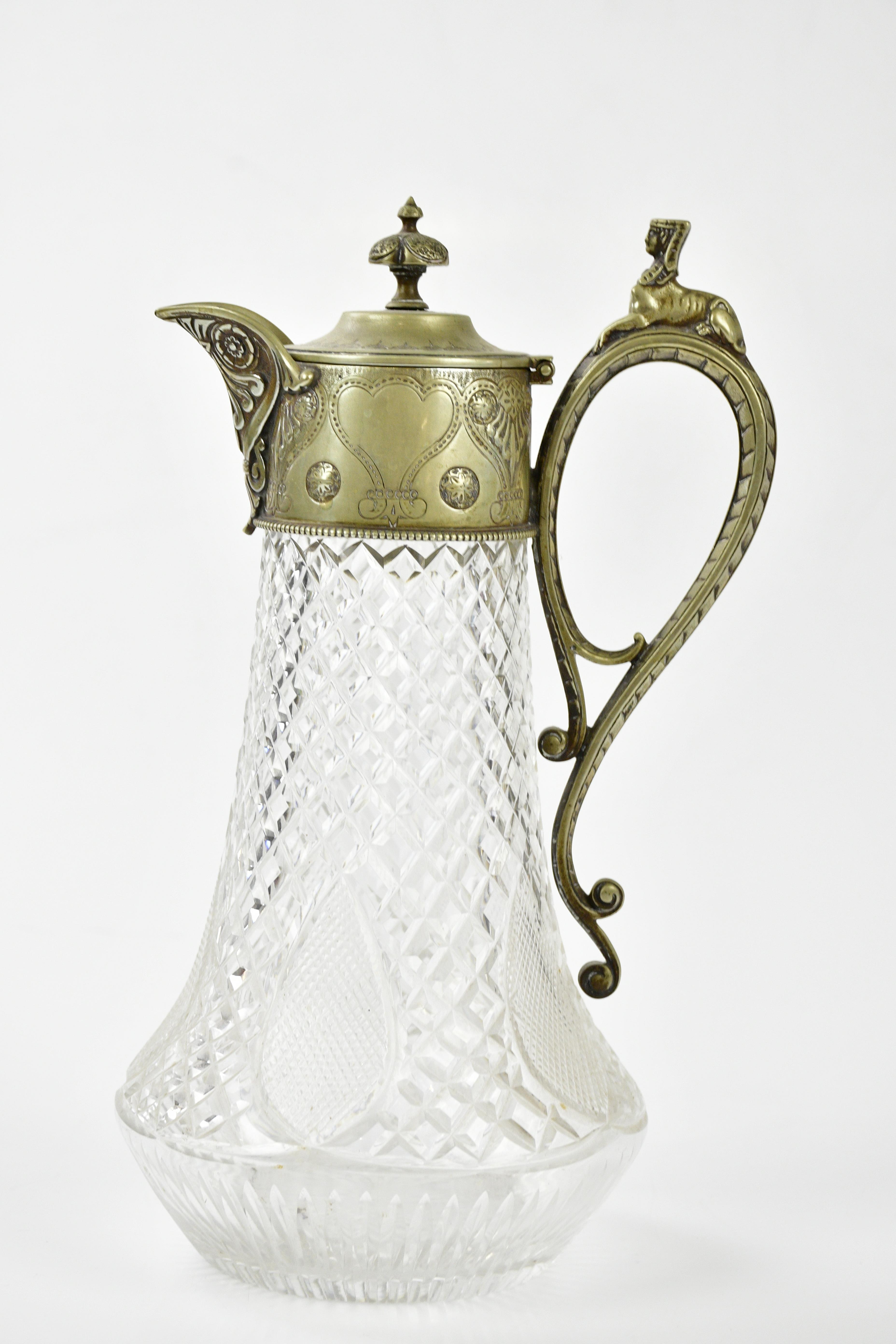 Lot 437 - A late Victorian cut glass claret jug with