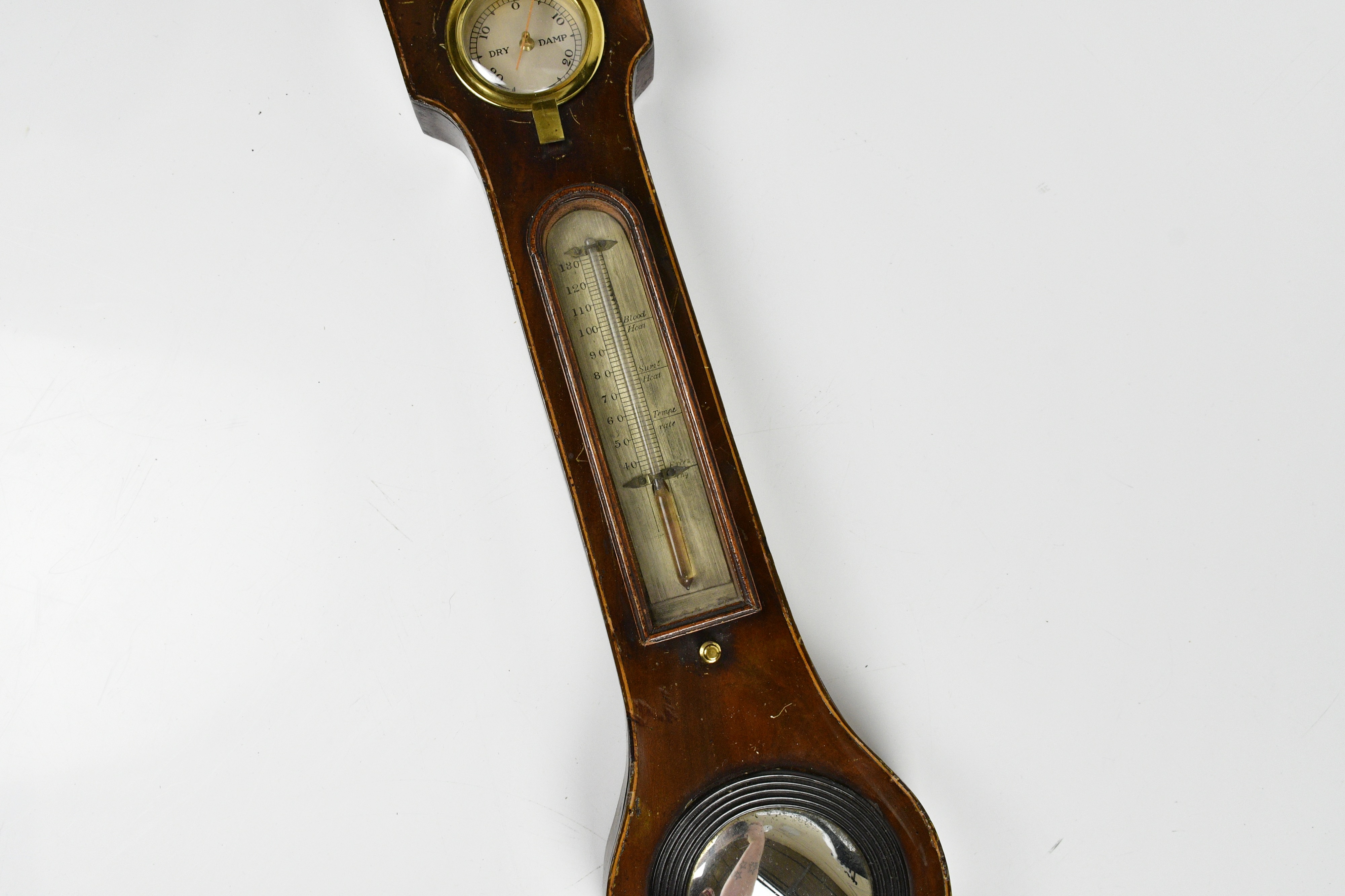 Lot 2249 - A Georgian mahogany wheel barometer with